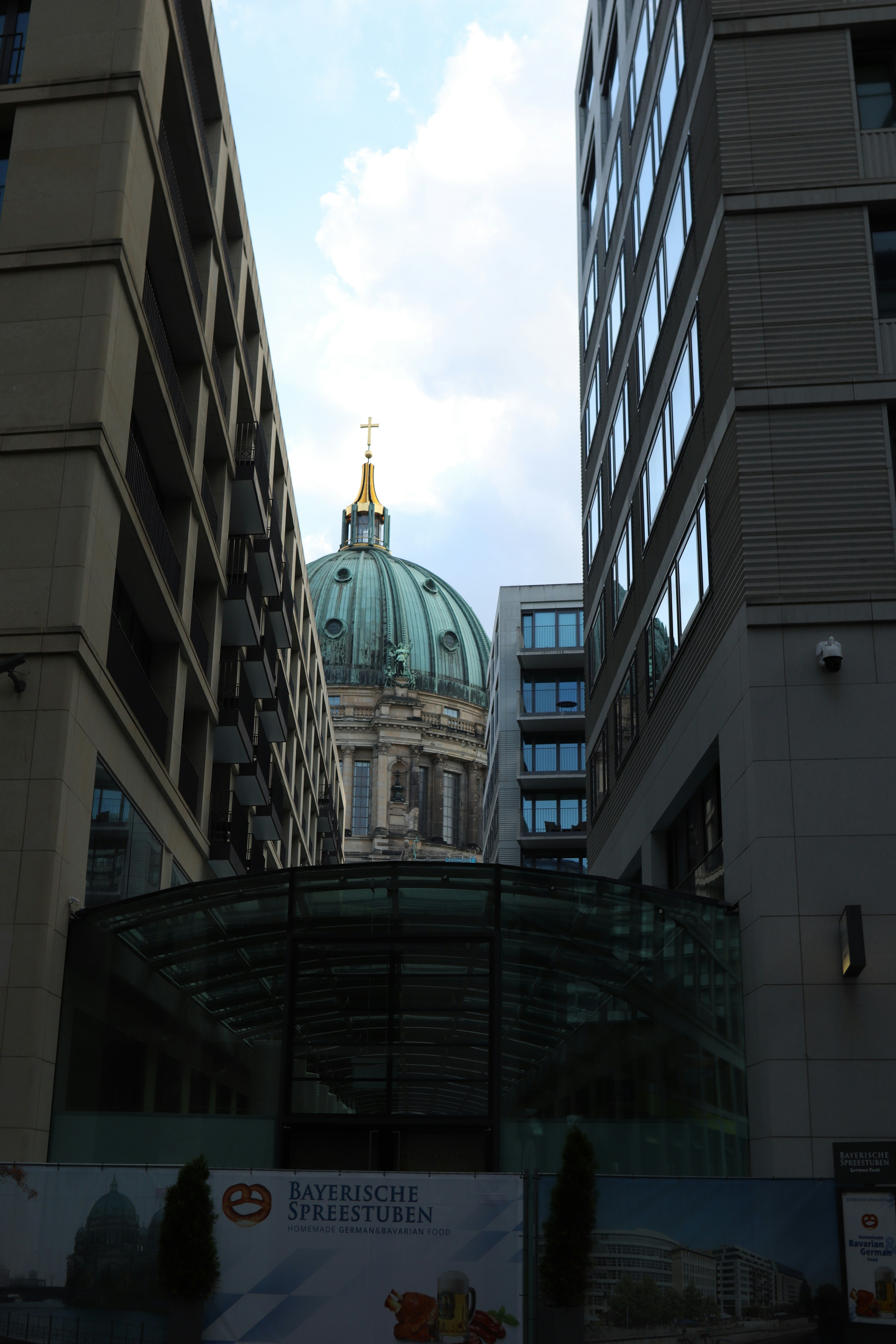 Rising dome between glass and stone