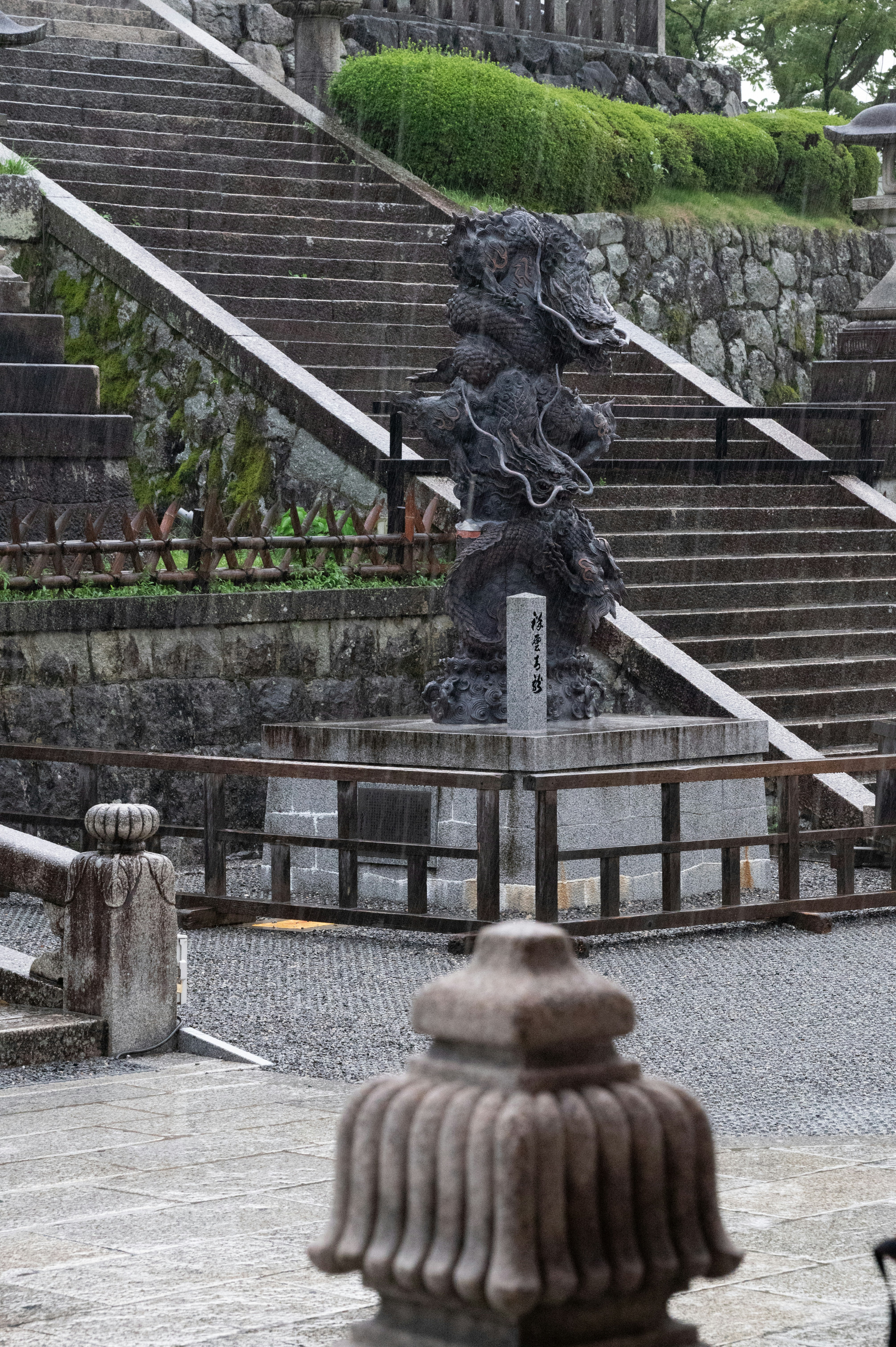 Rain-Kissed Dragon Guarding the Stone Terrace