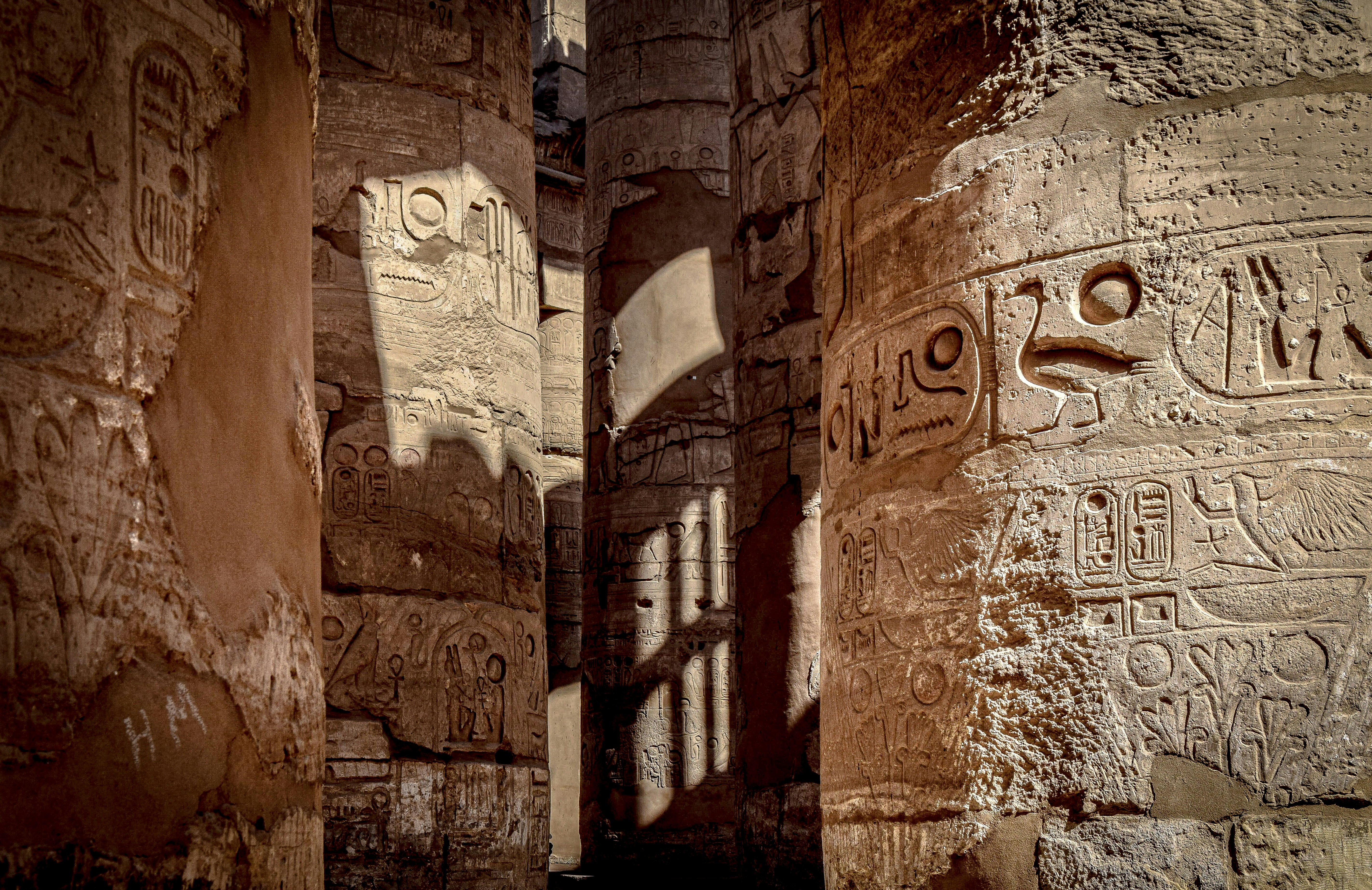 Sunlight Between Glyphs: A Passage Through Ancient Pillars