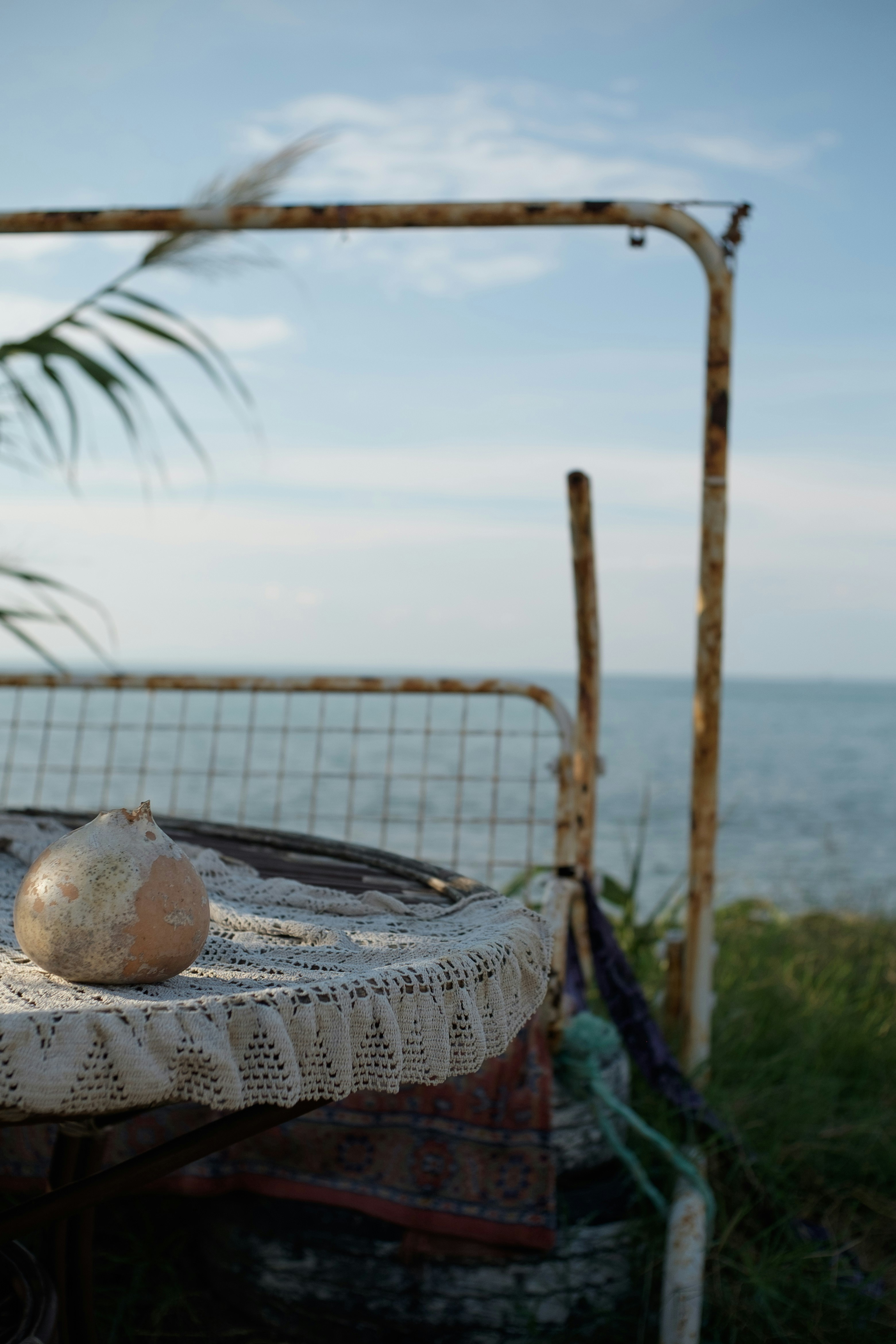 Rust, Lace, and Sea: A Quiet Coastal Still Life
