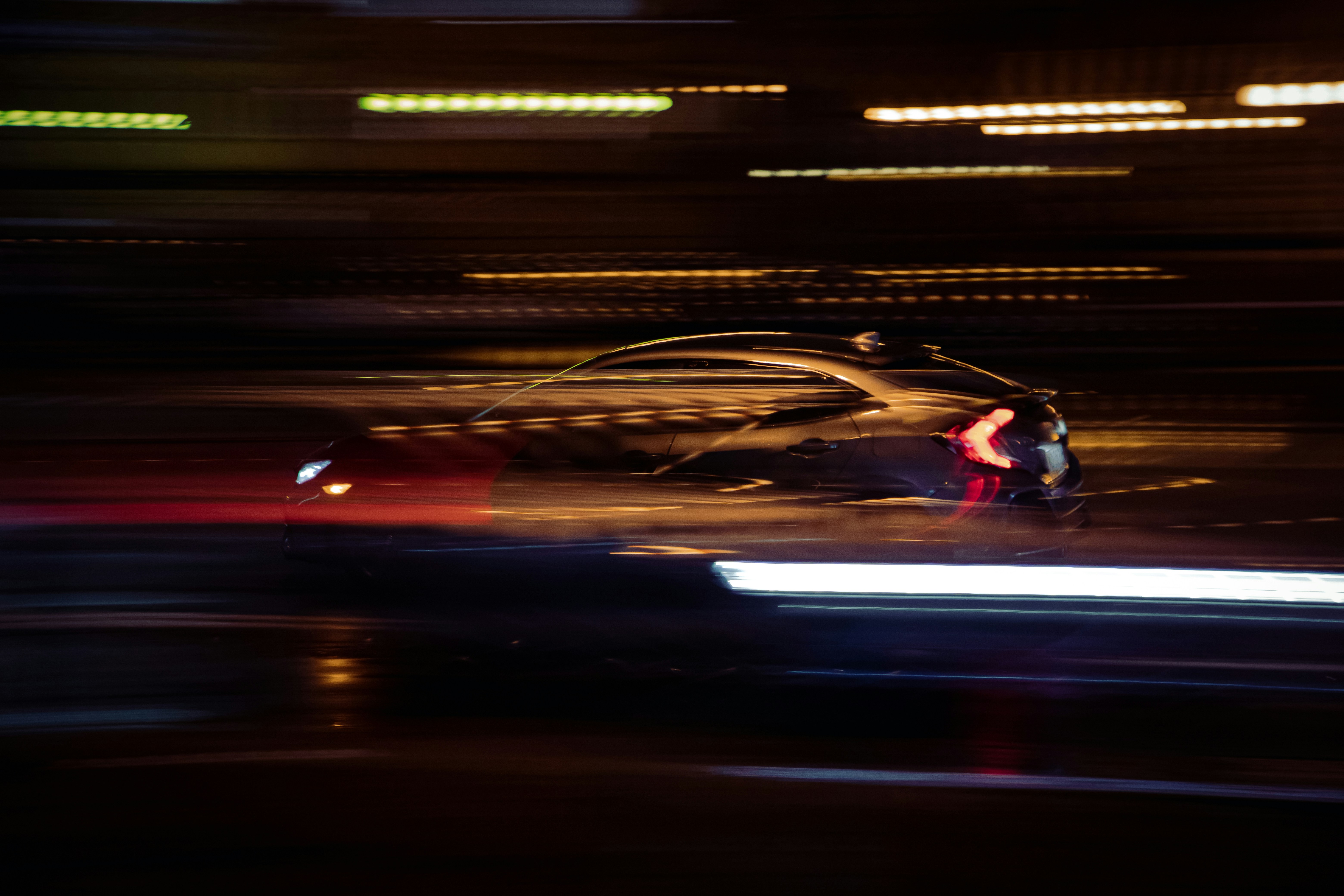 Neon Mirage: A Night Street Car in Dynamic Light Trails