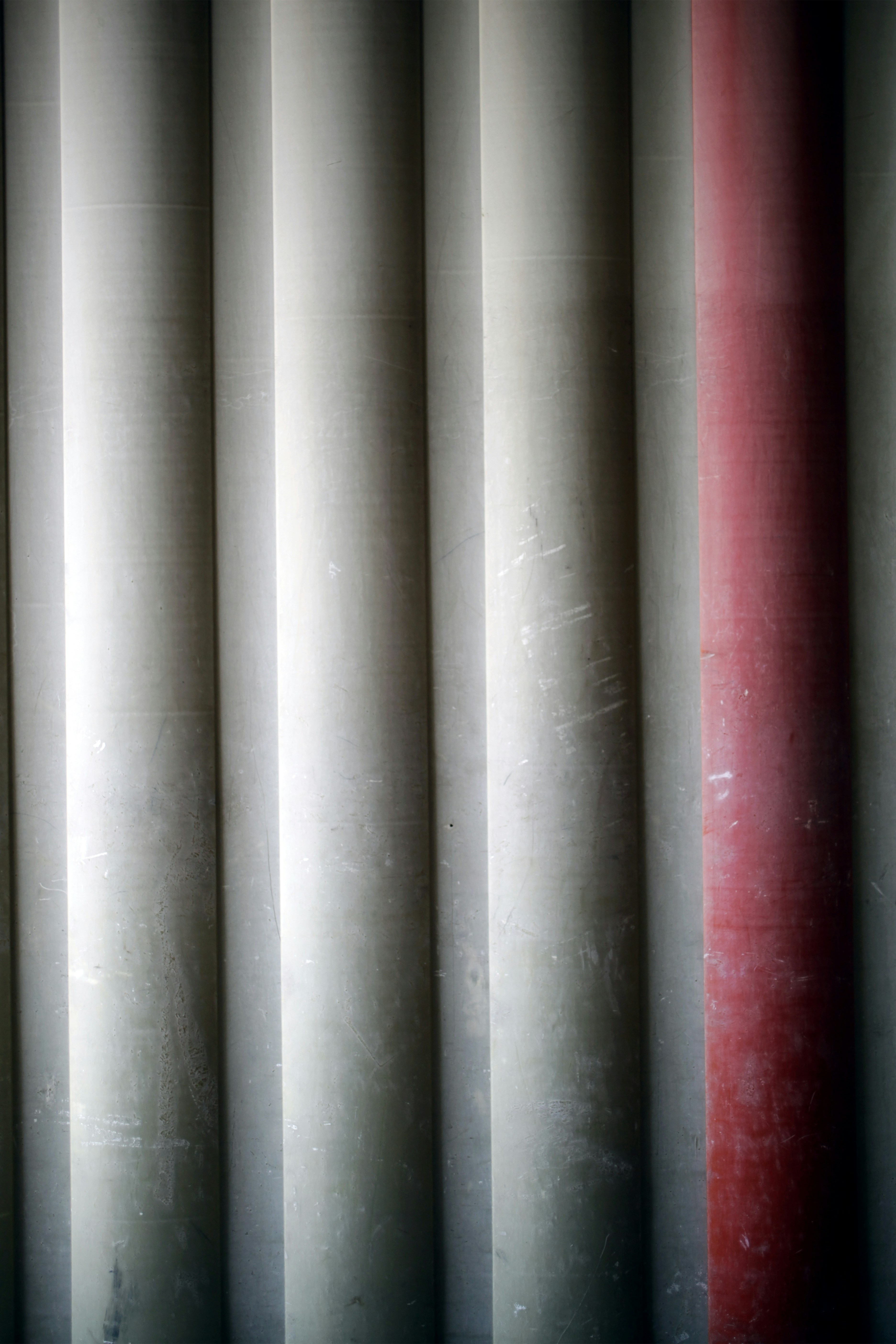 Rusted Columns in a Quiet Corridor