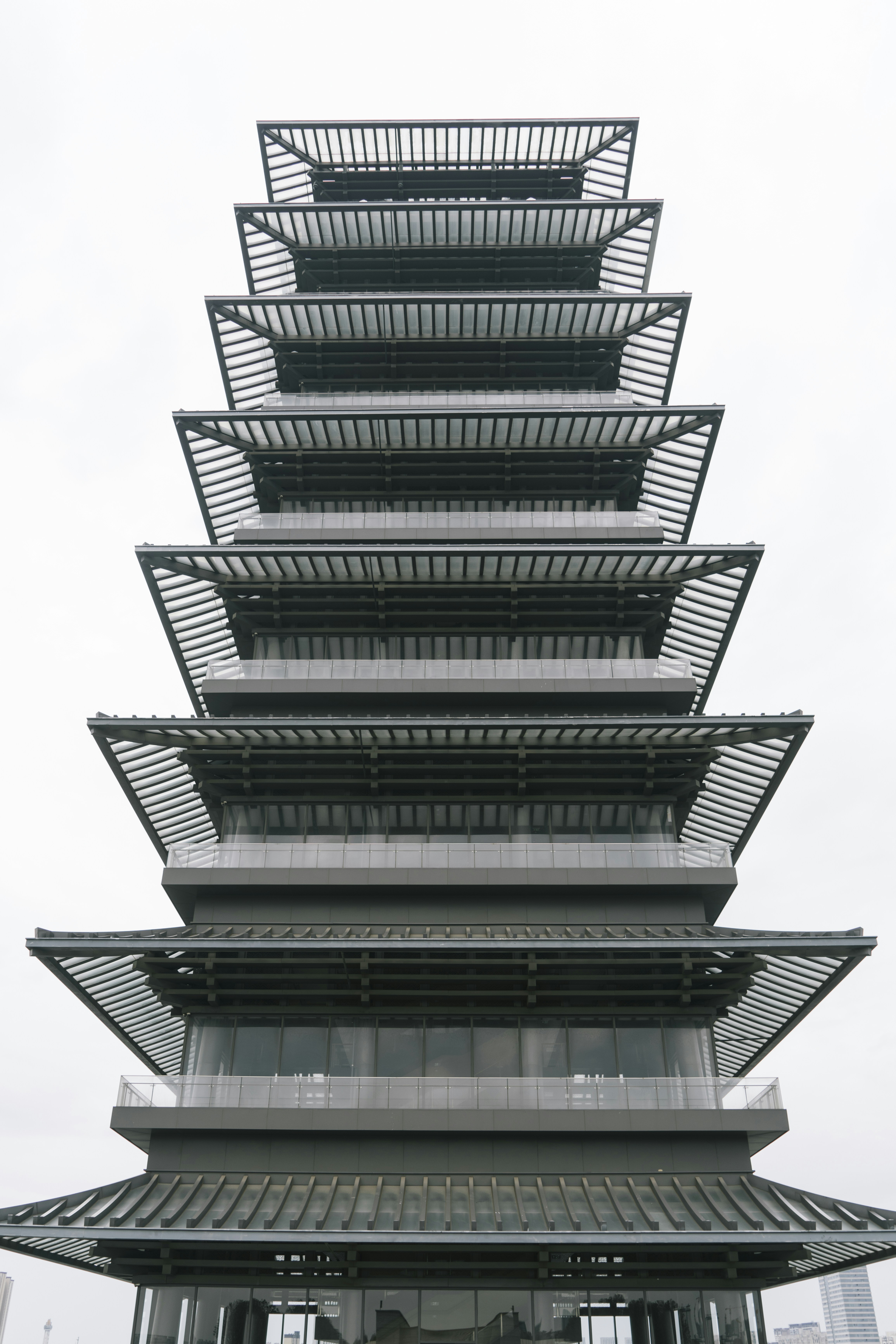 Tiered Steel Pagoda Reaching into a Pale Sky