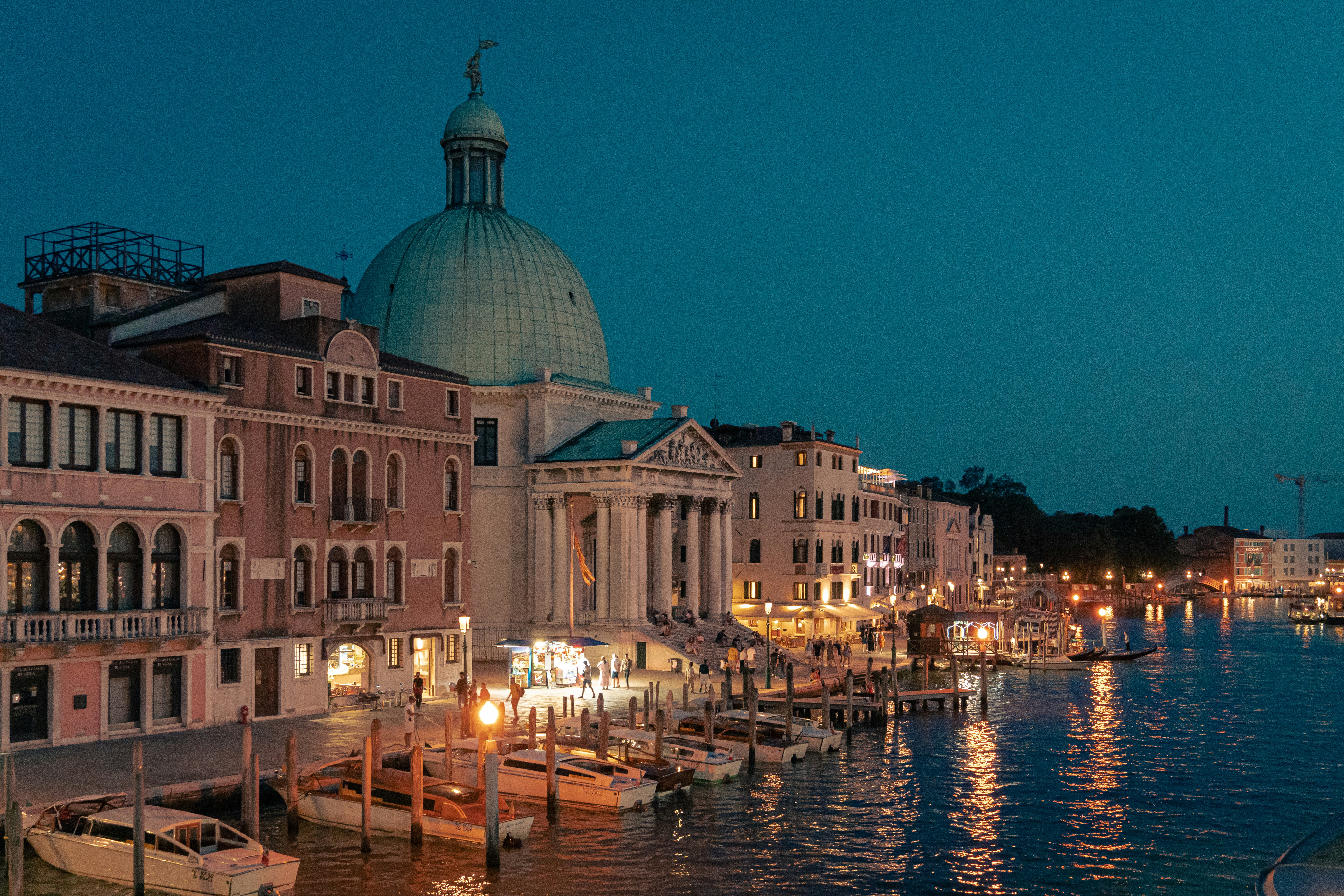Dusk on Venice's Grand Canal: Dome, Lanterns, and Reflections