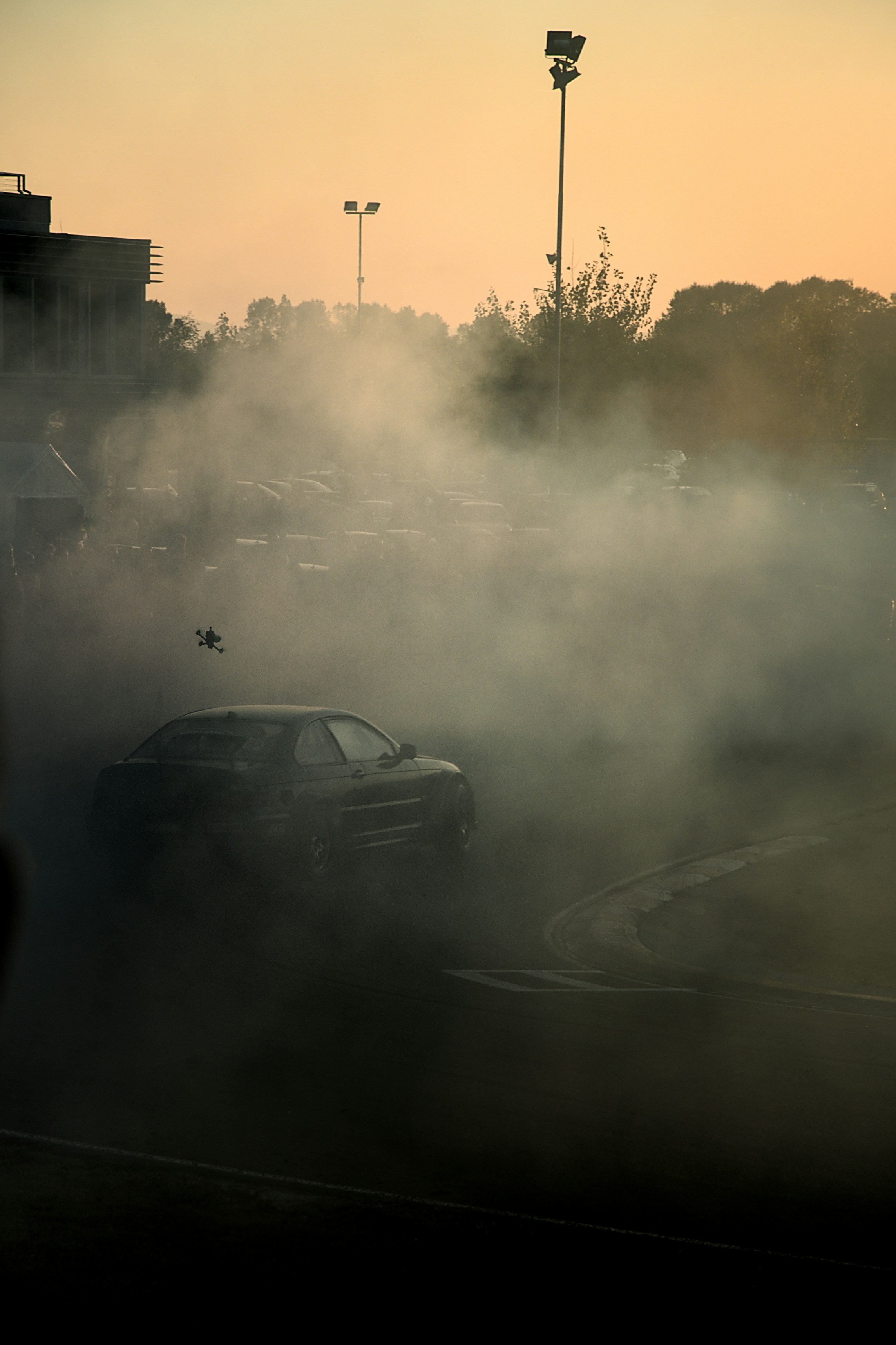 A parking lot filled with lots of smoke photo – Free Car Image on Unsplash