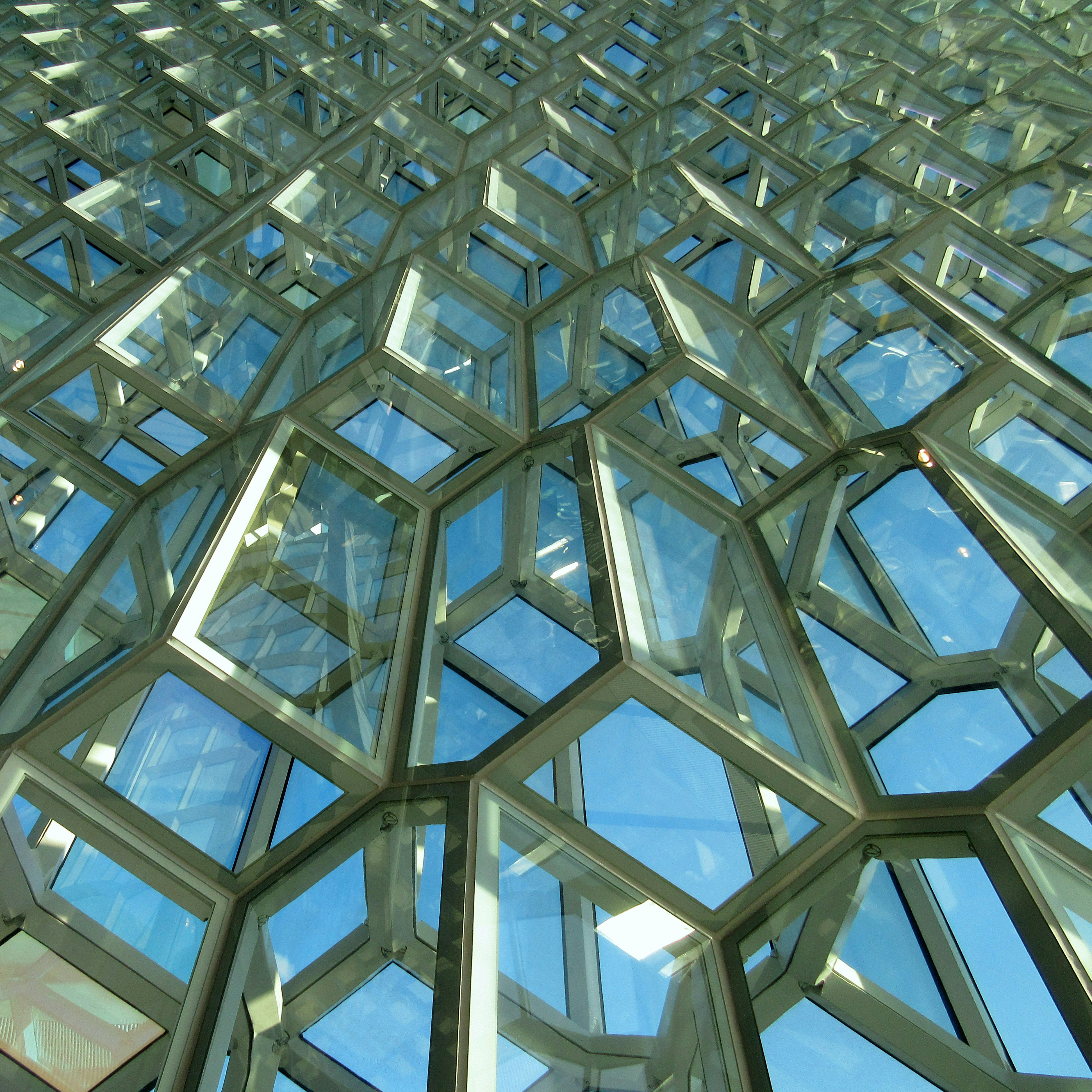 A close up of a building with many windows photo – Free Building Image ...