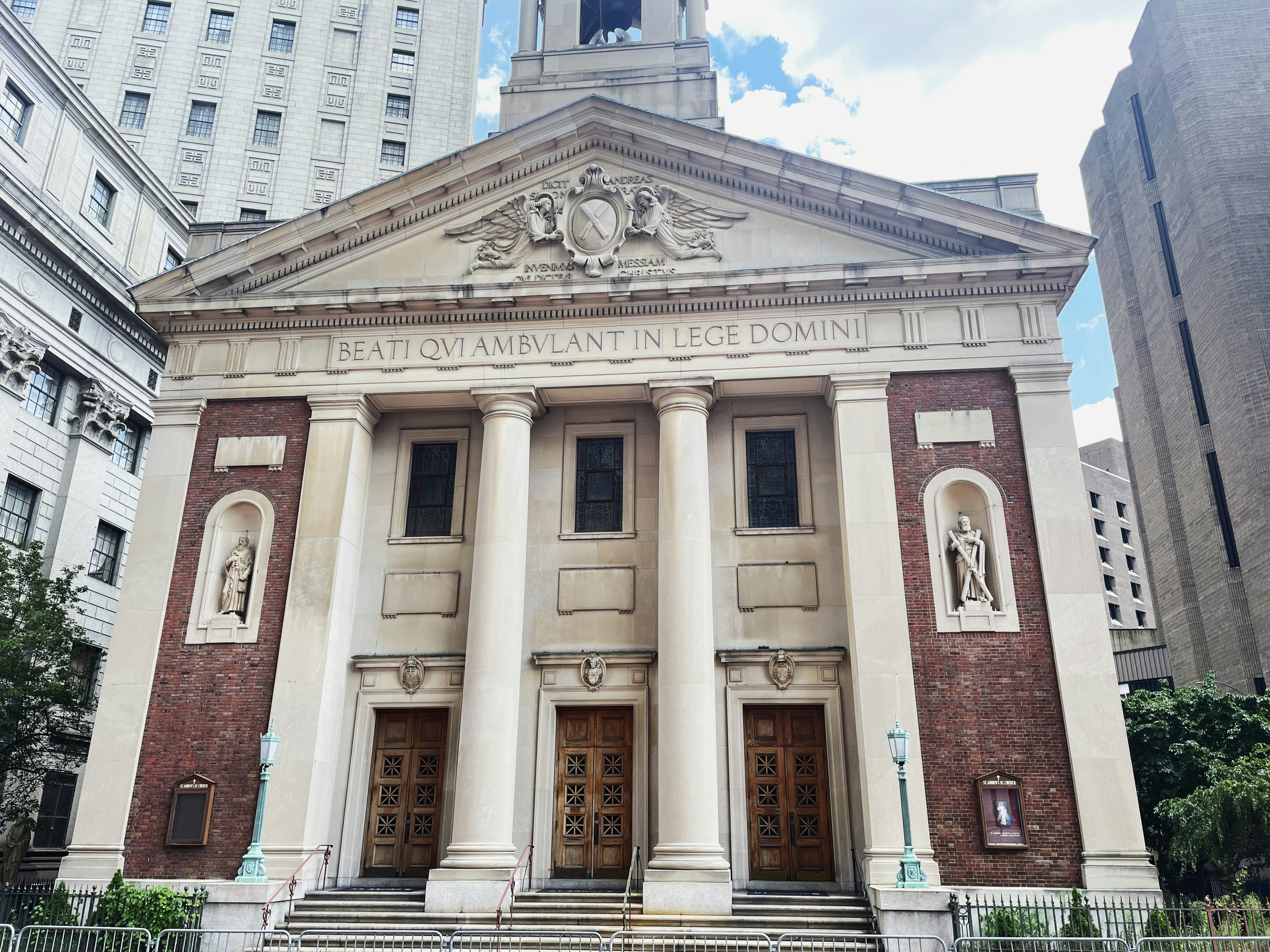 Between Brick and Sky: A Neoclassical Portal Anchored by Urban Skyscrapers