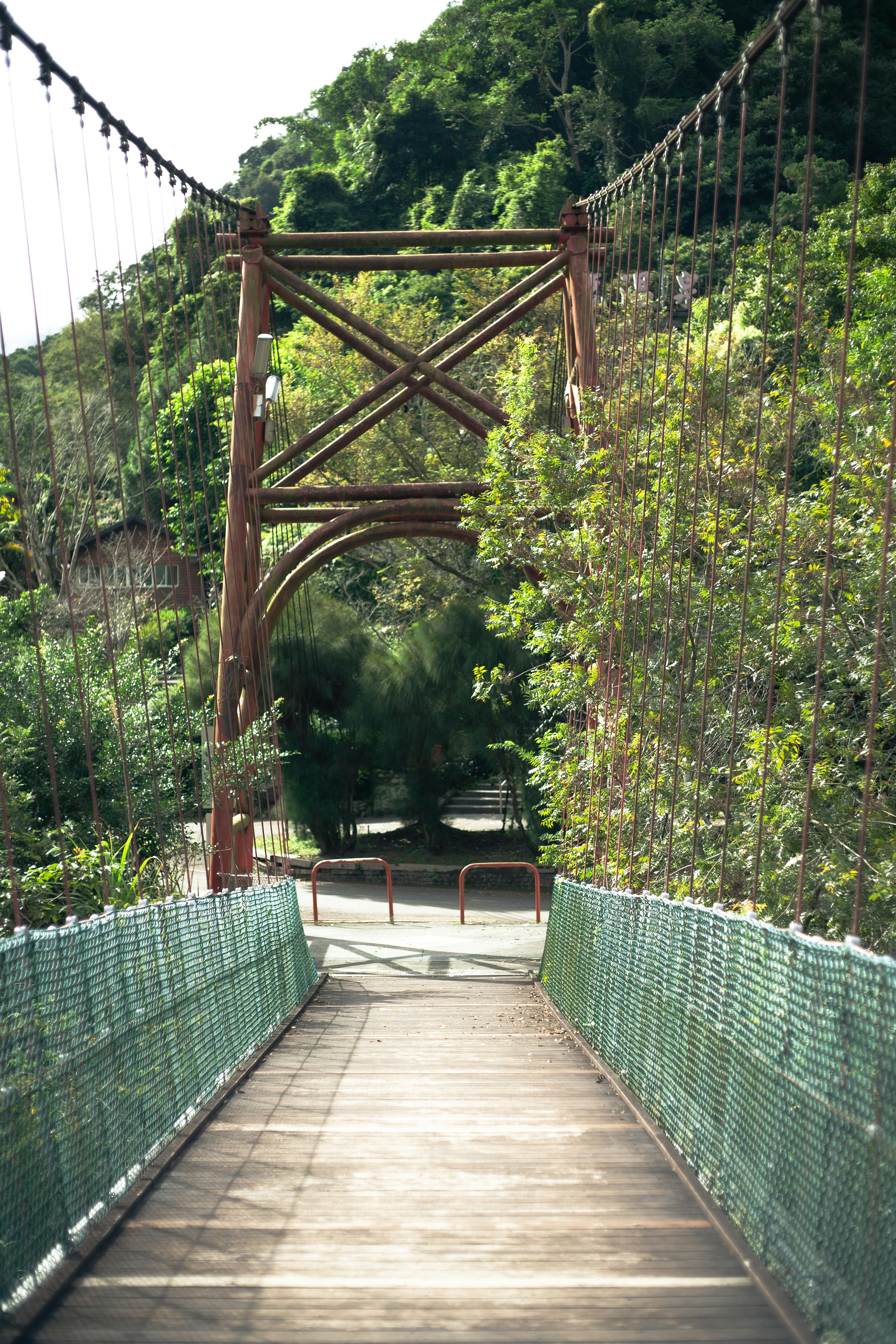 A bridge that has a metal railing on it photo – Free Path Image on Unsplash