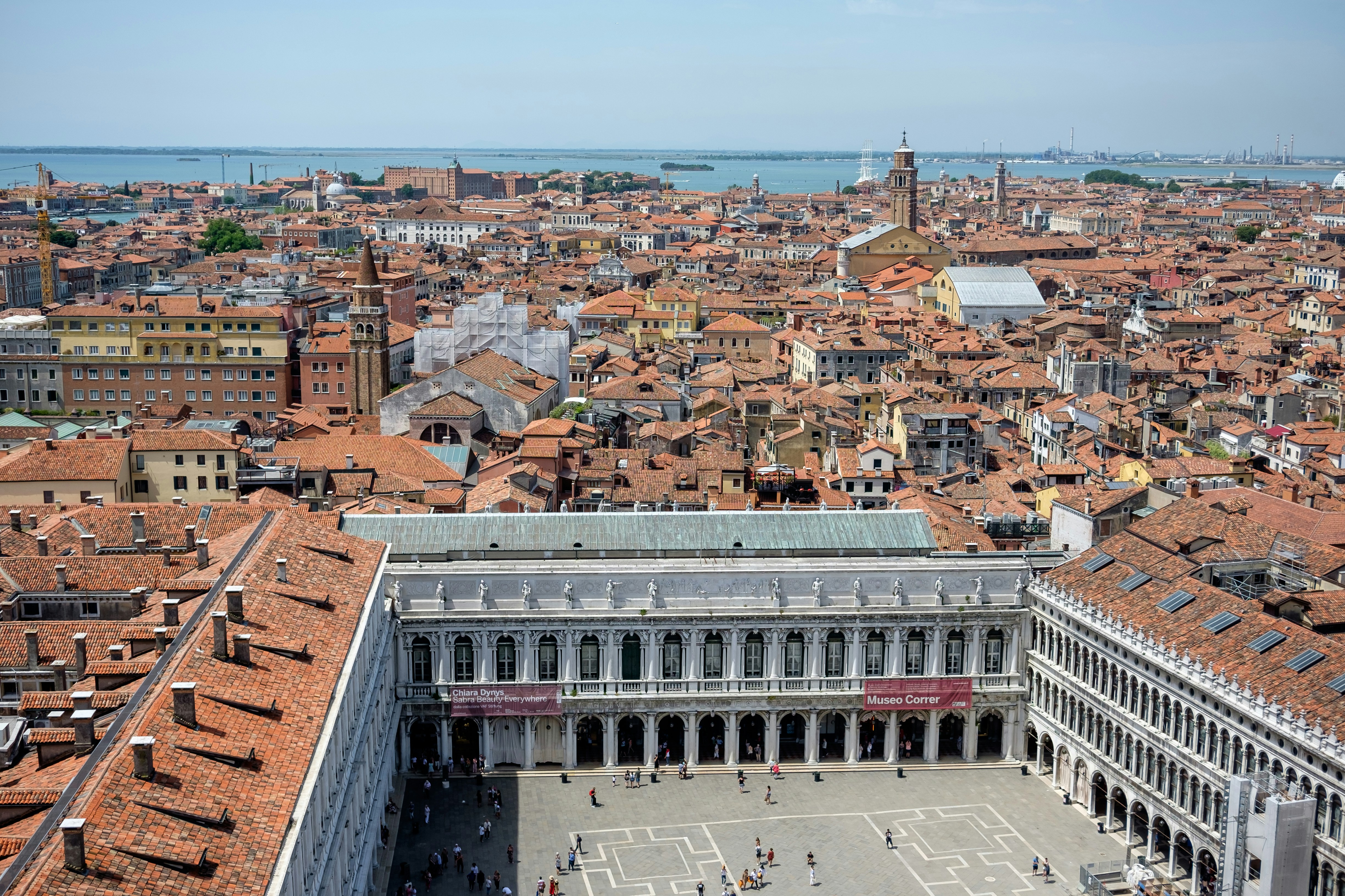 an aerial view of a city with many buildings