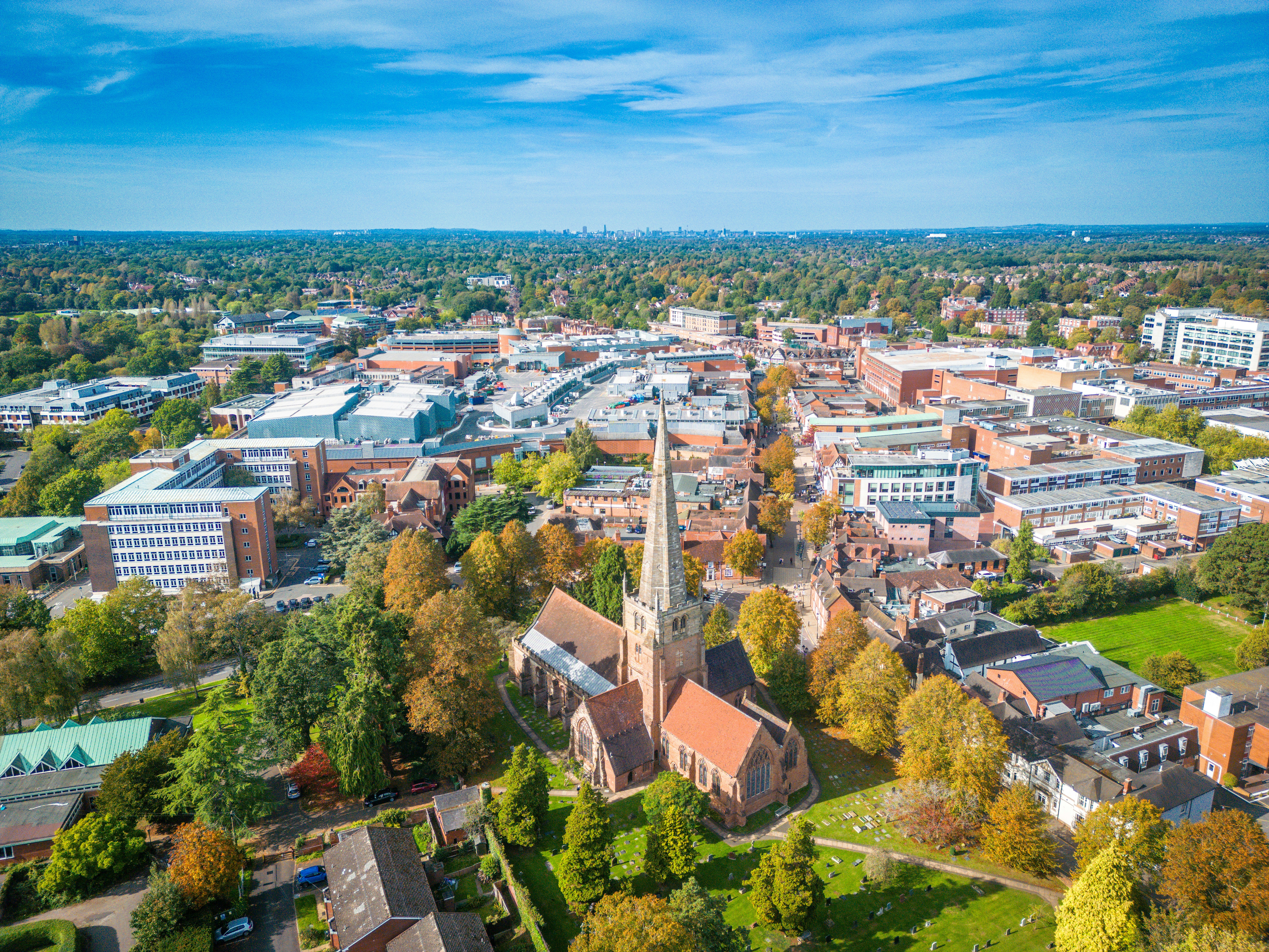 An aerial view of a city with trees and buildings photo – Free Solihull ...