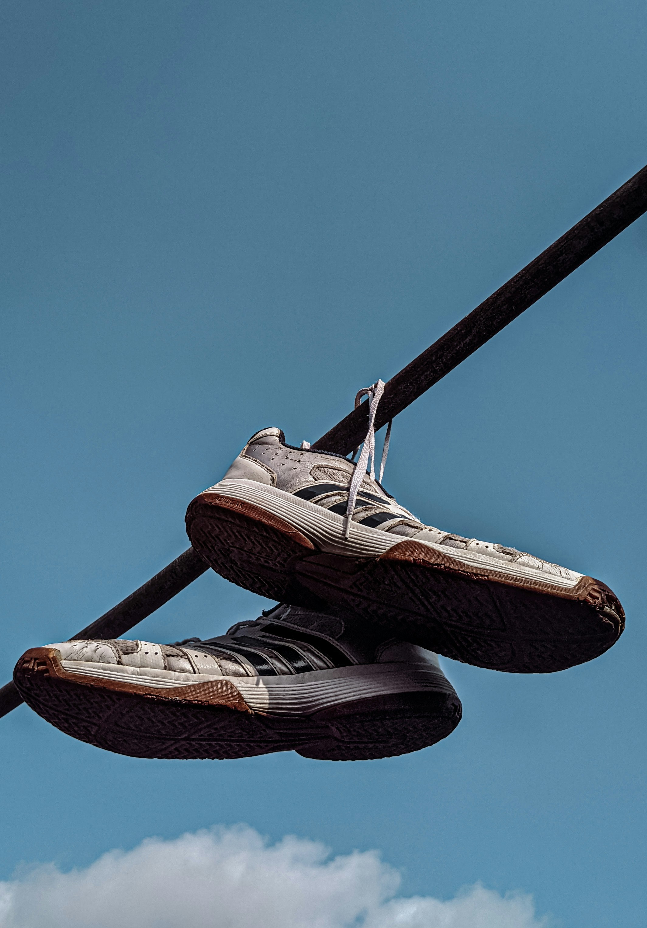 Lacebound in the Sky: Sneakers on a Diagonal Wire