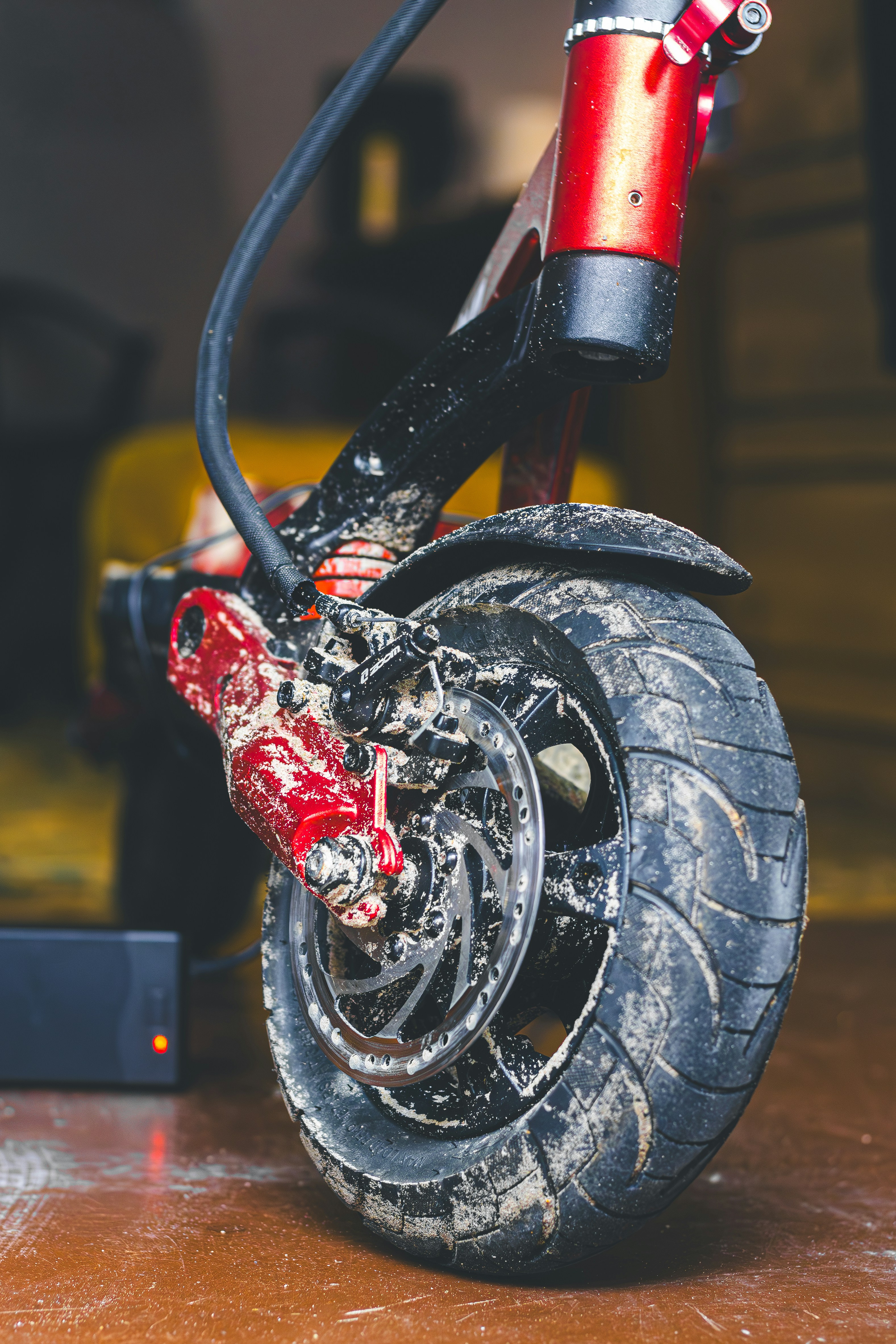 A close up of a red and black motorcycle tire photo – Free Depth of ...