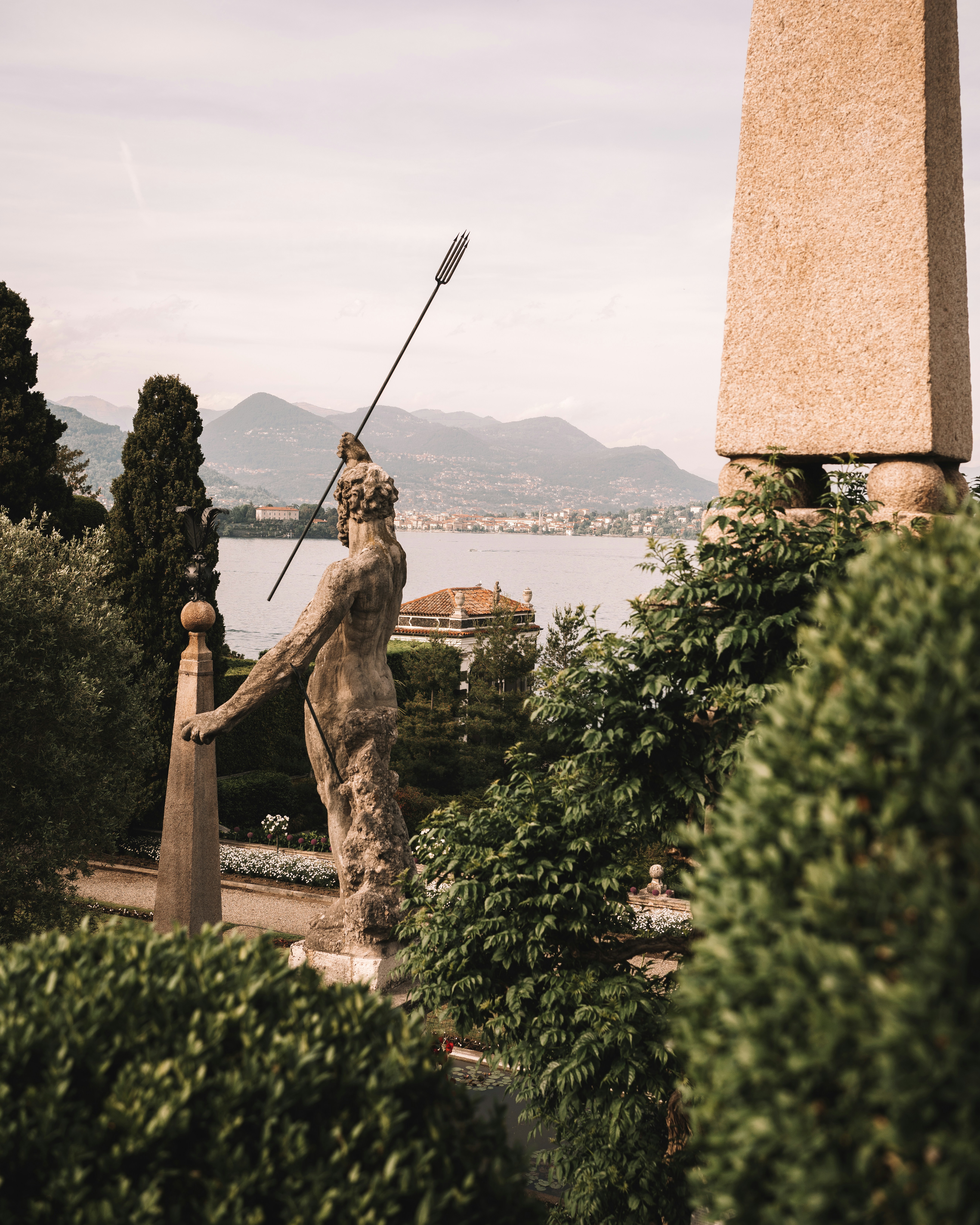 A statue of a man holding a broom photo – Free Photography Image on ...
