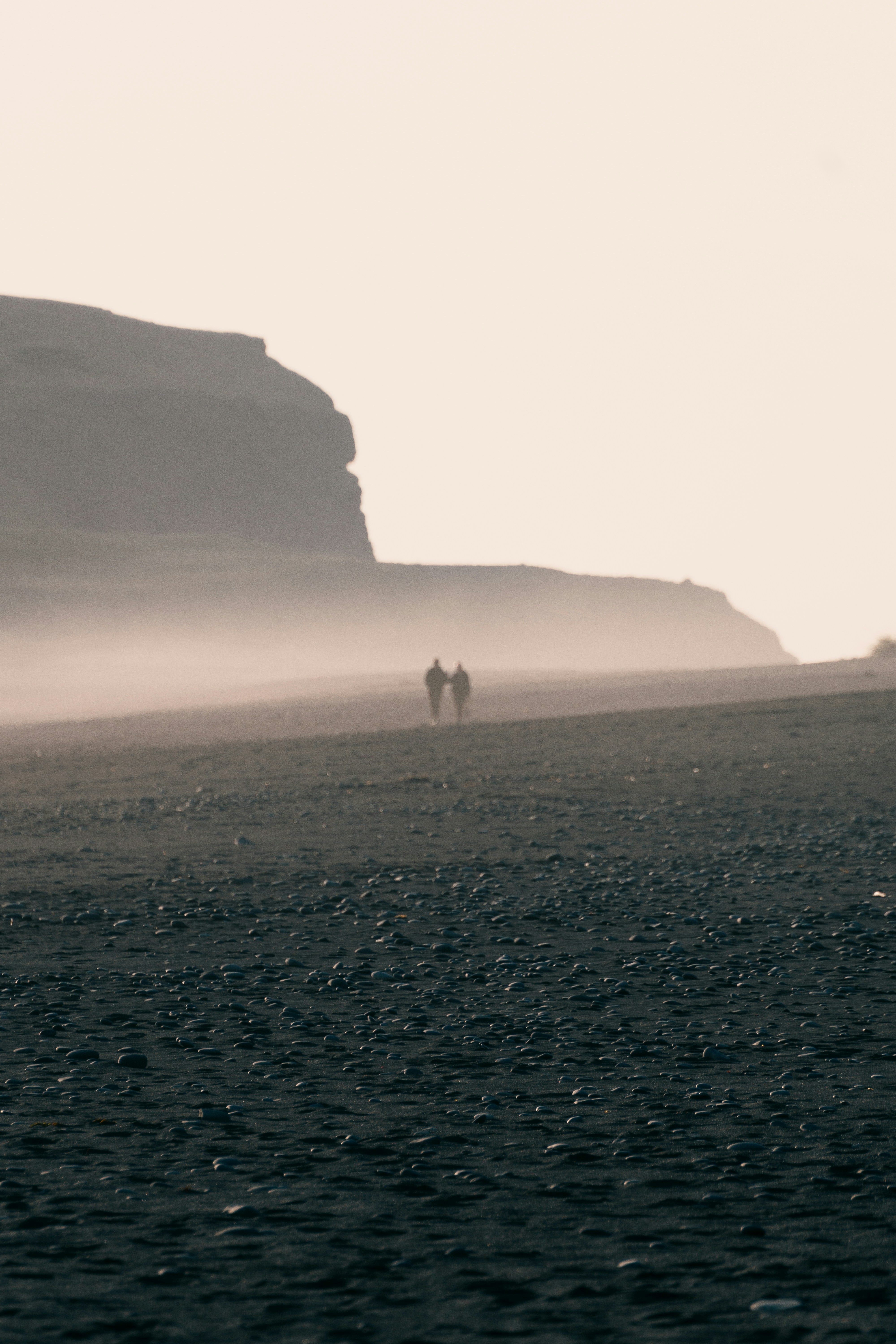 Two Figures on a Misty Shore: Quiet Hem of the Day