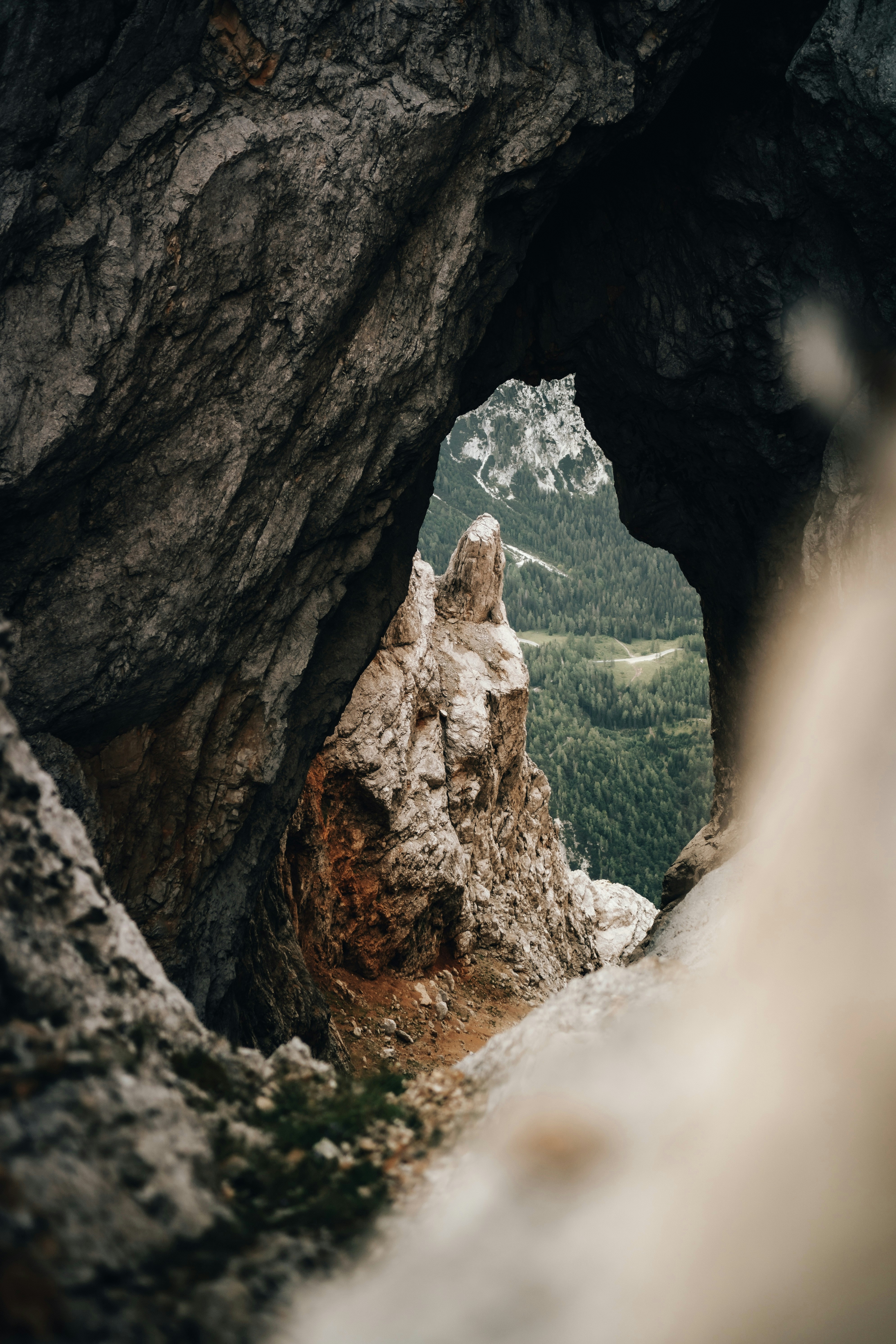 A rock formation with a hole in the middle photo – Free Rock Image on Unsplash