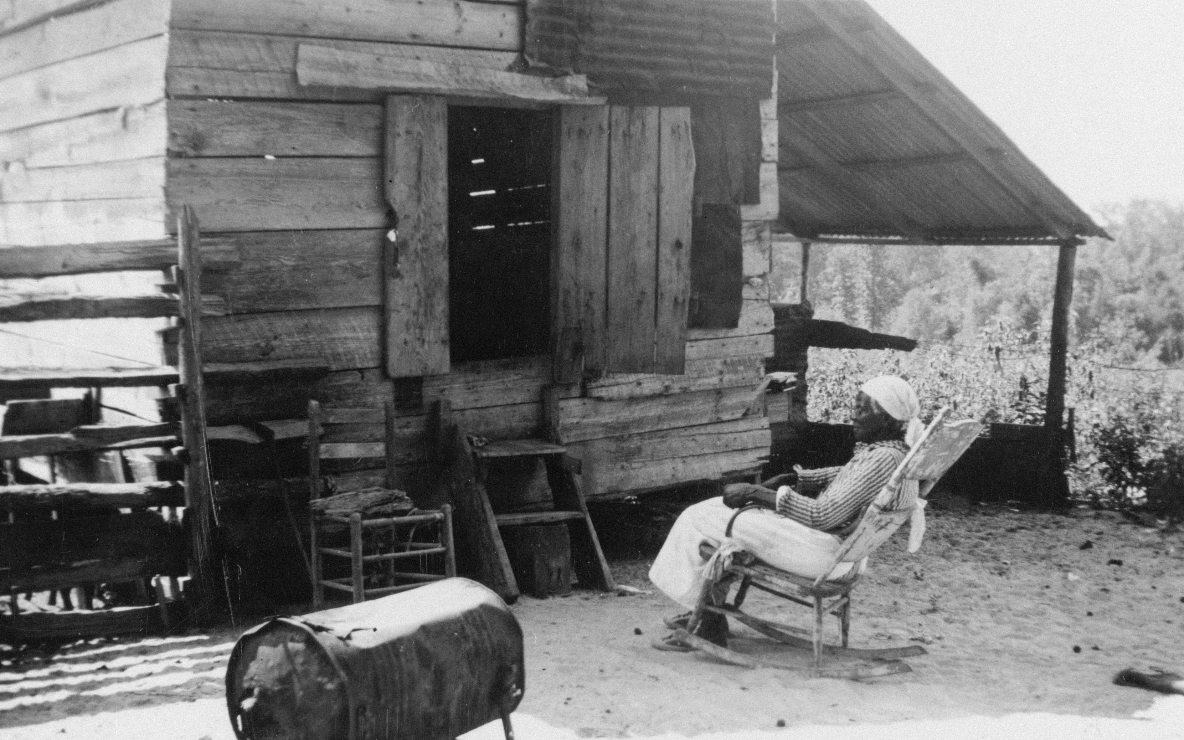 Old Aunt Julia Ann Jackson, age 102 and the corn crib where she lives ...