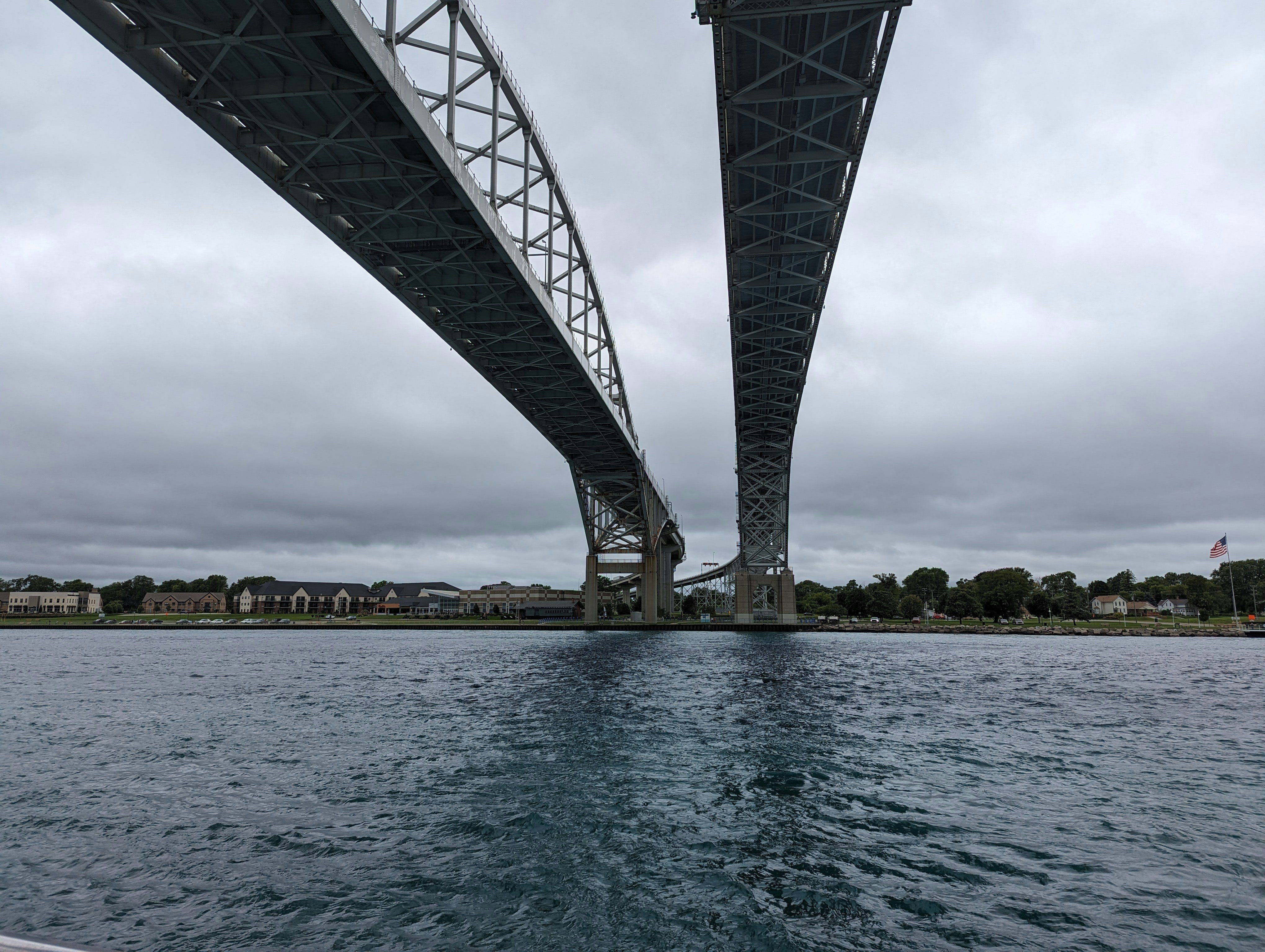 A view of the underside of a bridge from a boat photo – Free Cityscape ...