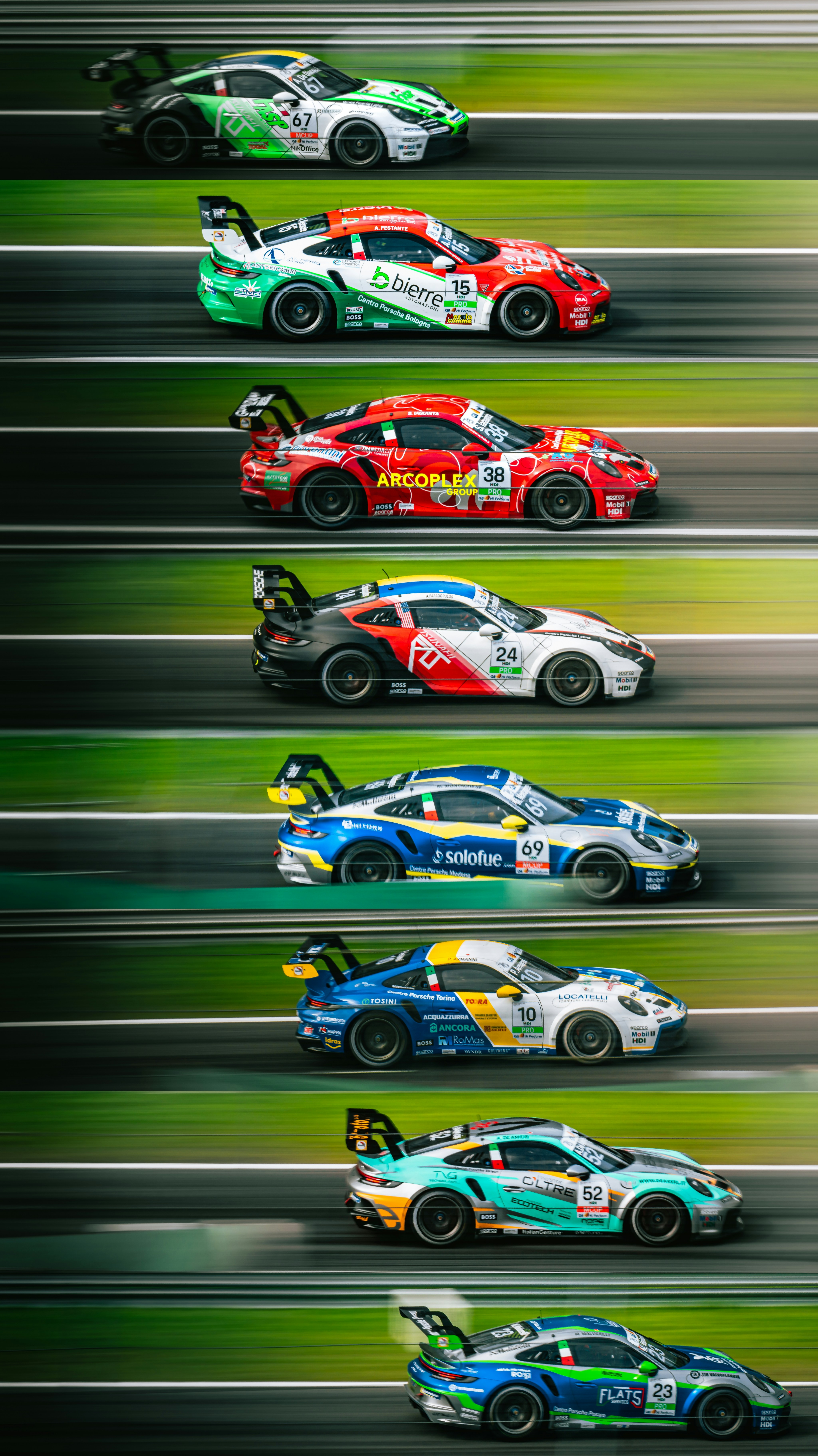 A group of cars driving down a race track photo – Free Autodromo ...