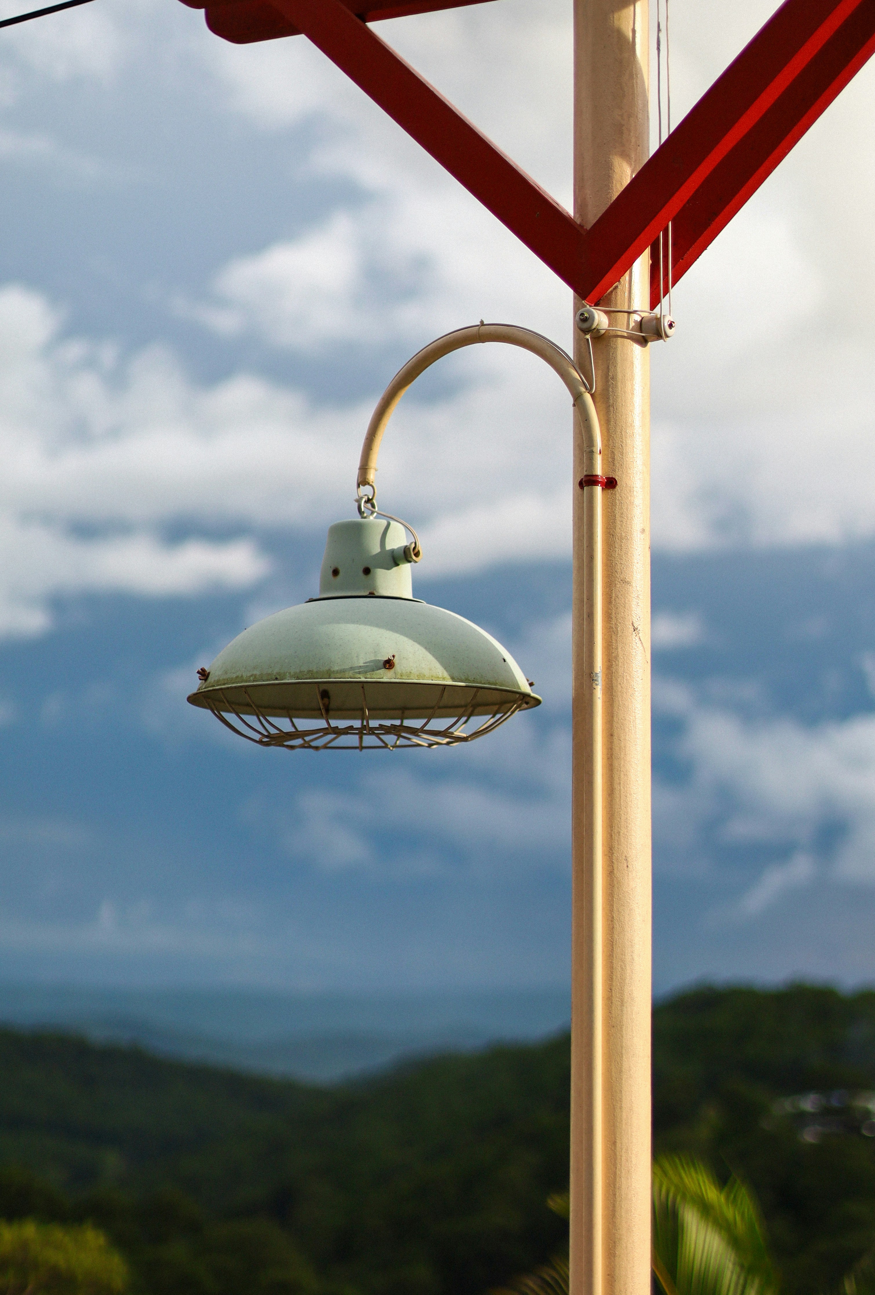 Industrial Lantern Framed by Roofline and Sky