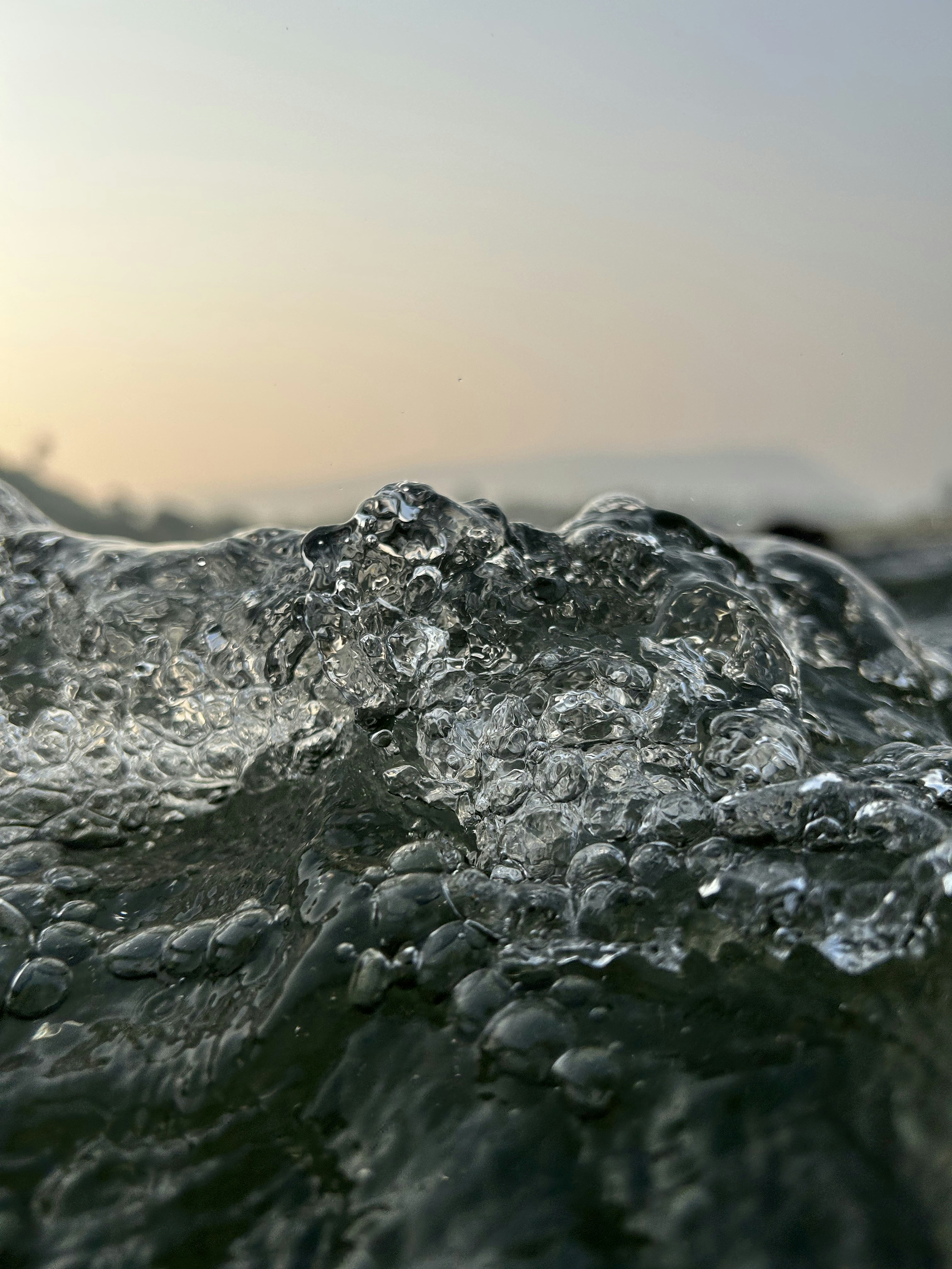 A close up of water with a sky in the background photo – Free Rambilli ...