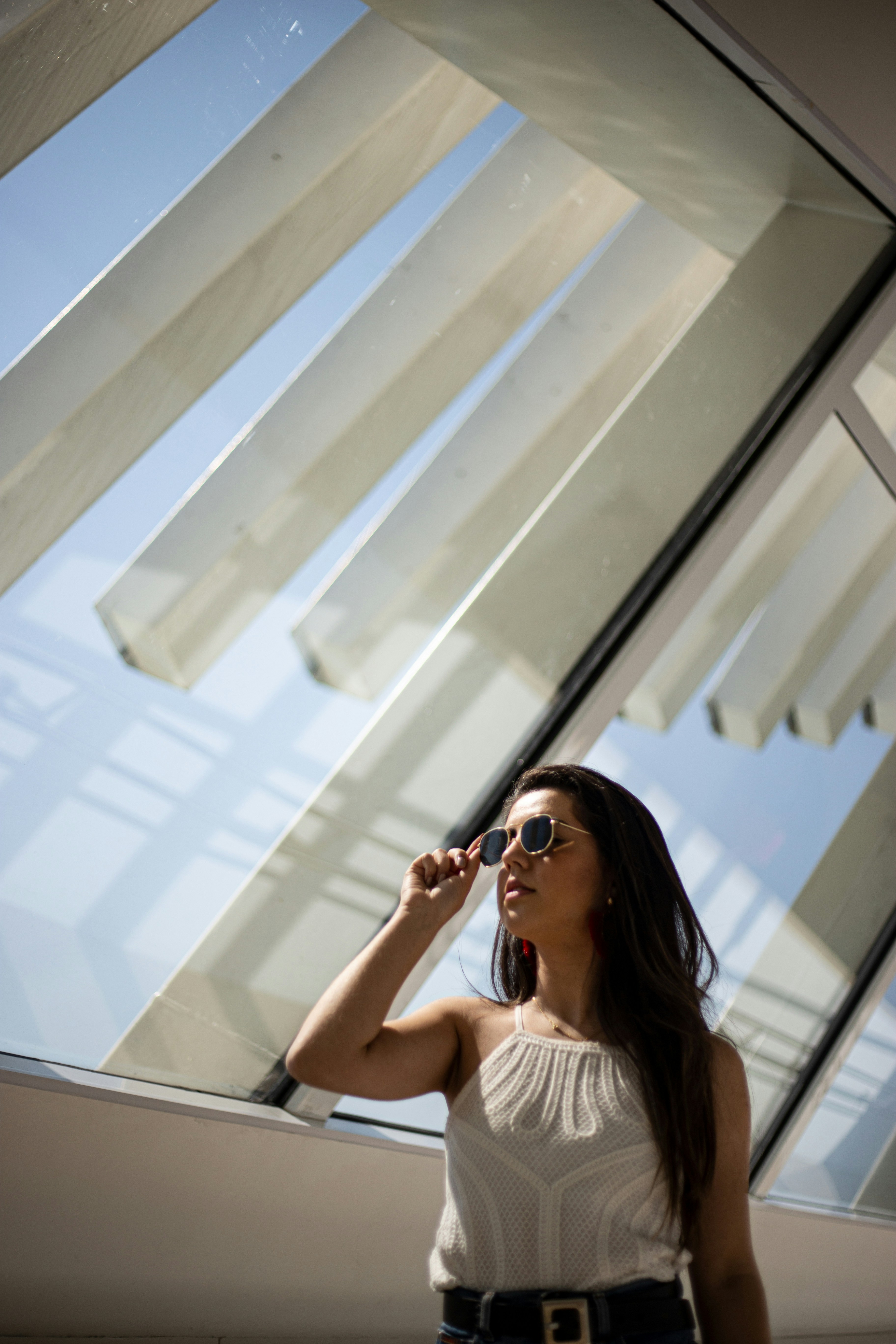 Glazed Grace: Portrait Beneath a Tilted Glass Canopy