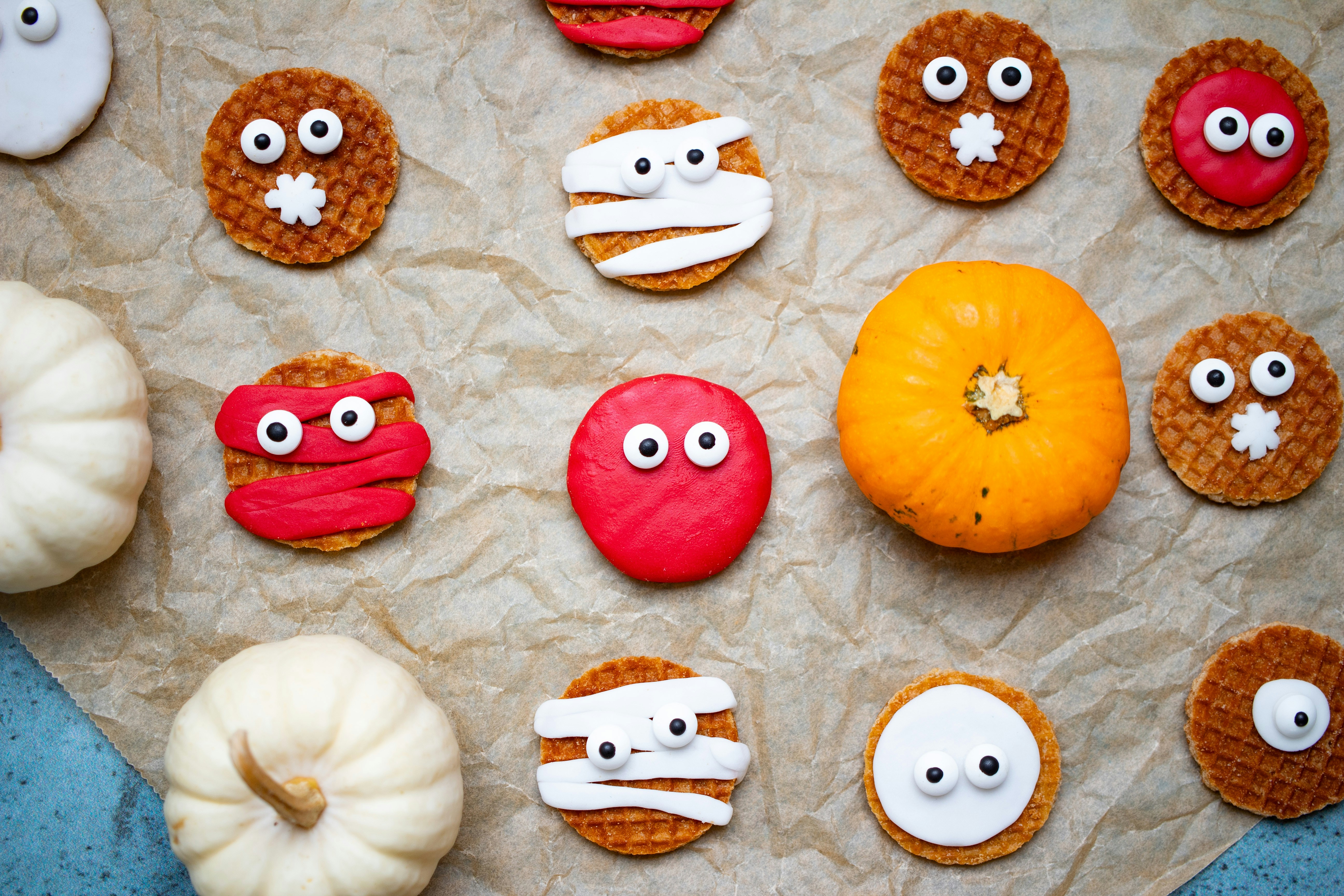 A table topped with lots of decorated cookies photo – Free Sweets Image ...