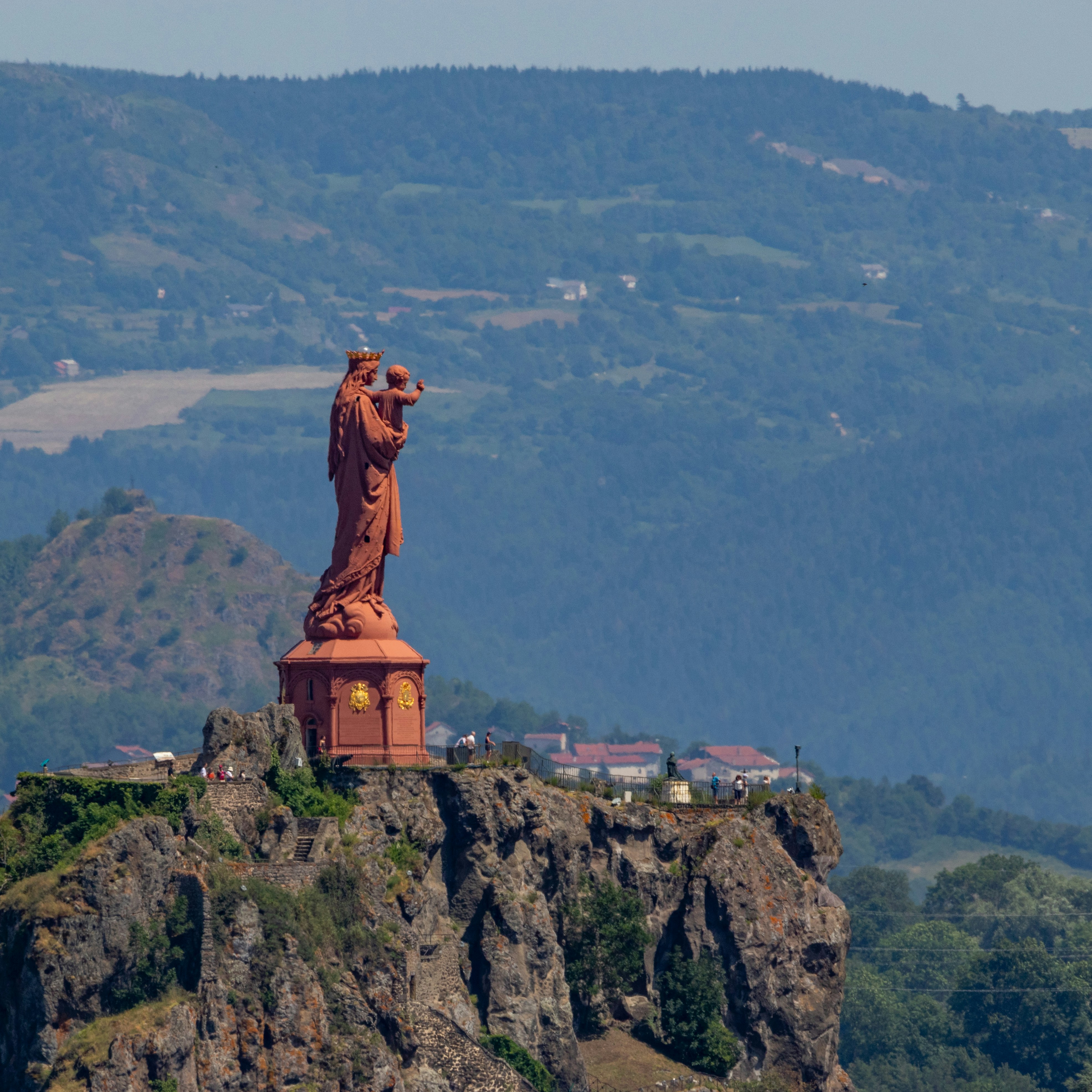 Terracotta Sentinel on a Promontory Overlooking a Rolling Valley