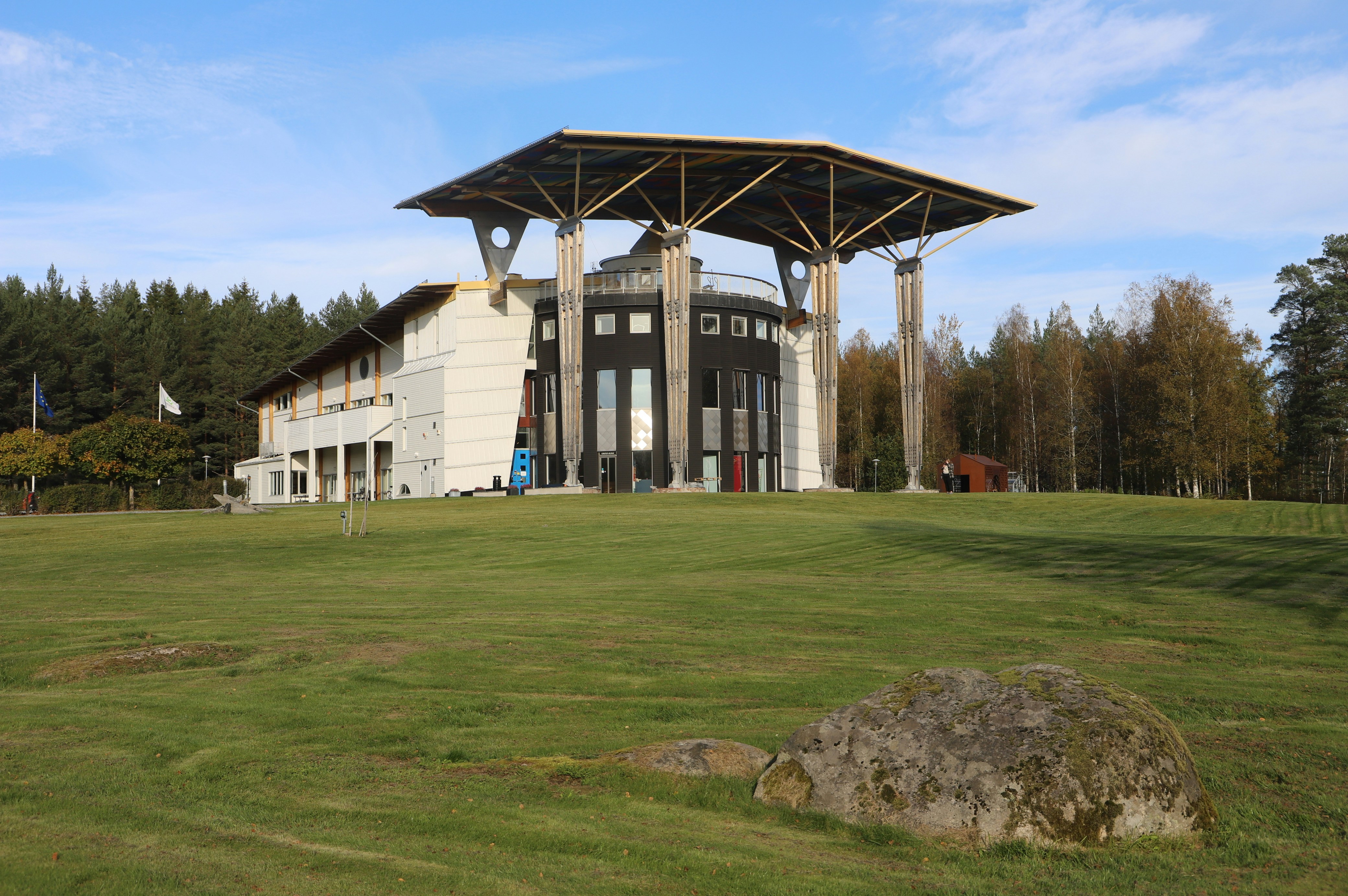 Sweeping Timber Canopy Crowns a Modern Park Pavilion