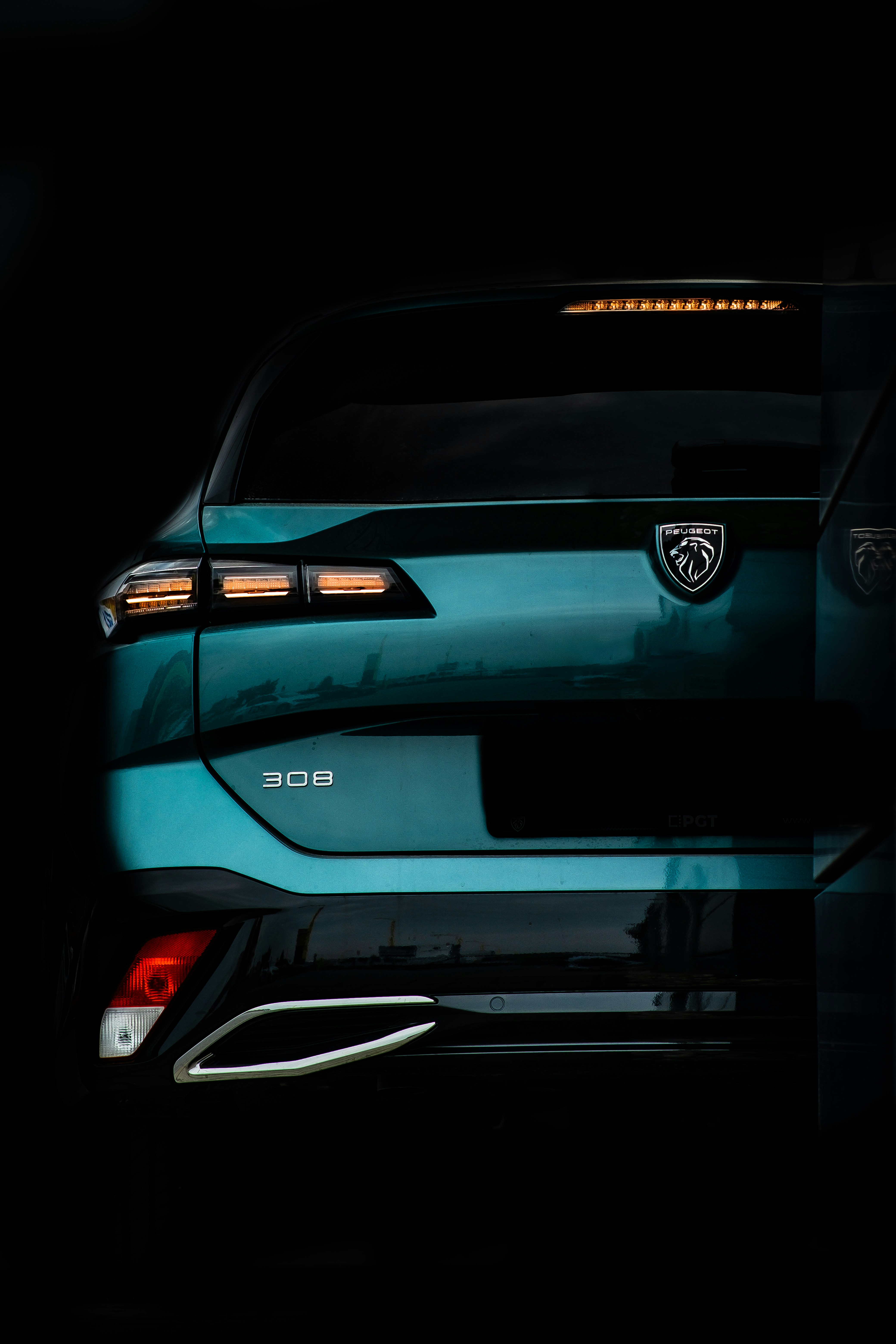 The rear end of a blue sports car photo – Free Car Image on Unsplash