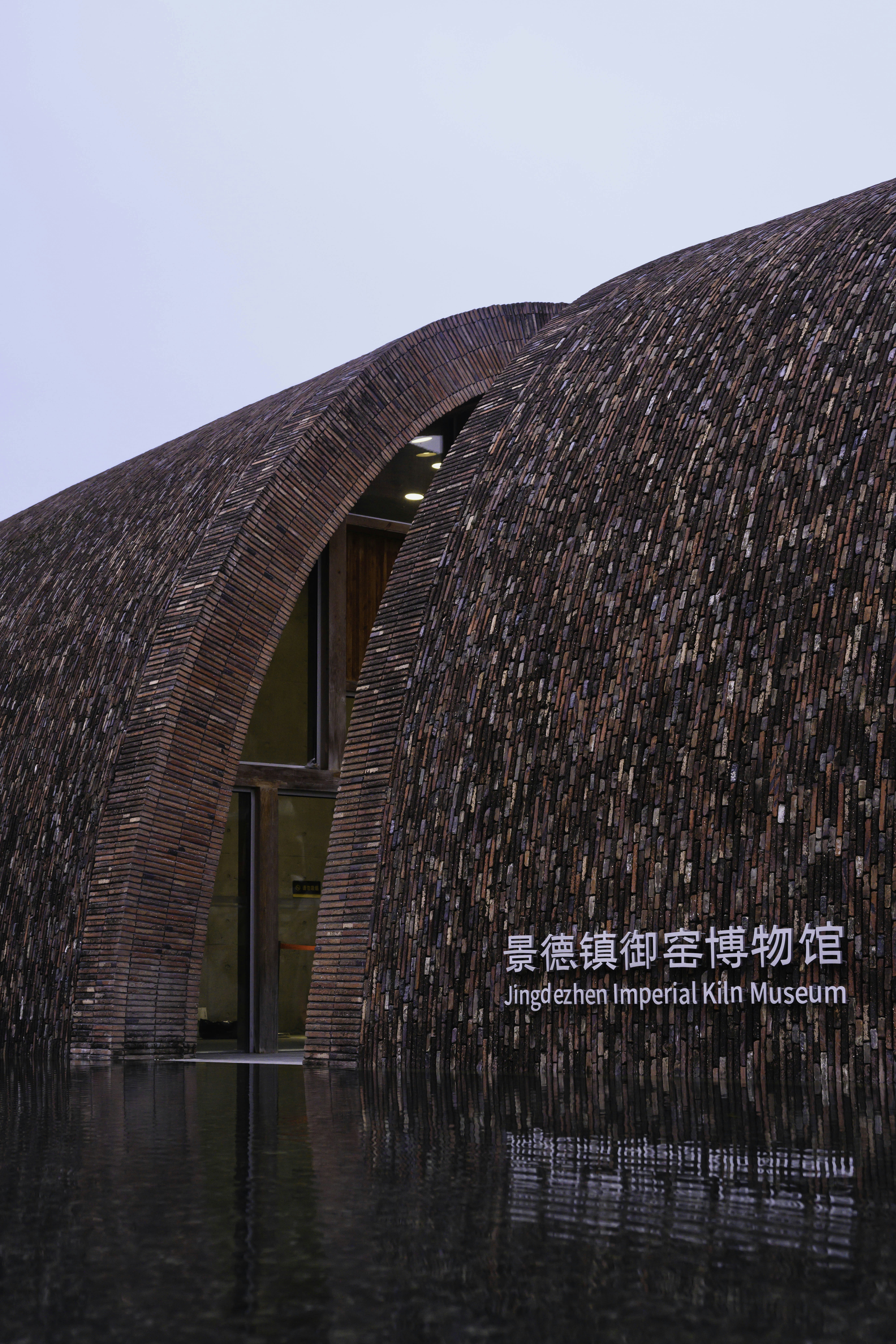 A building that has a very long roof photo – Free Building Image on ...