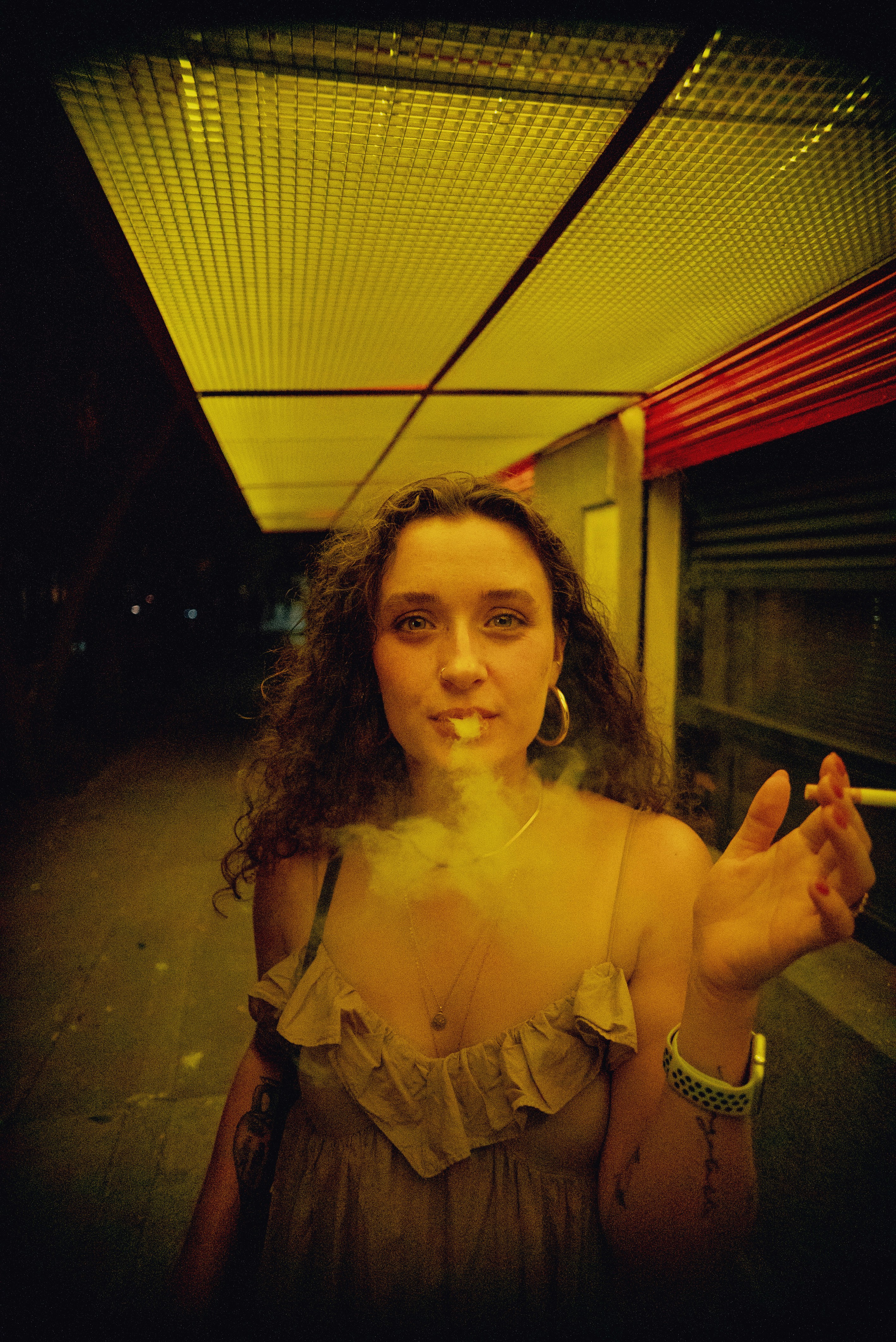 Amber Neon Night Portrait Under a Yellow Canopy