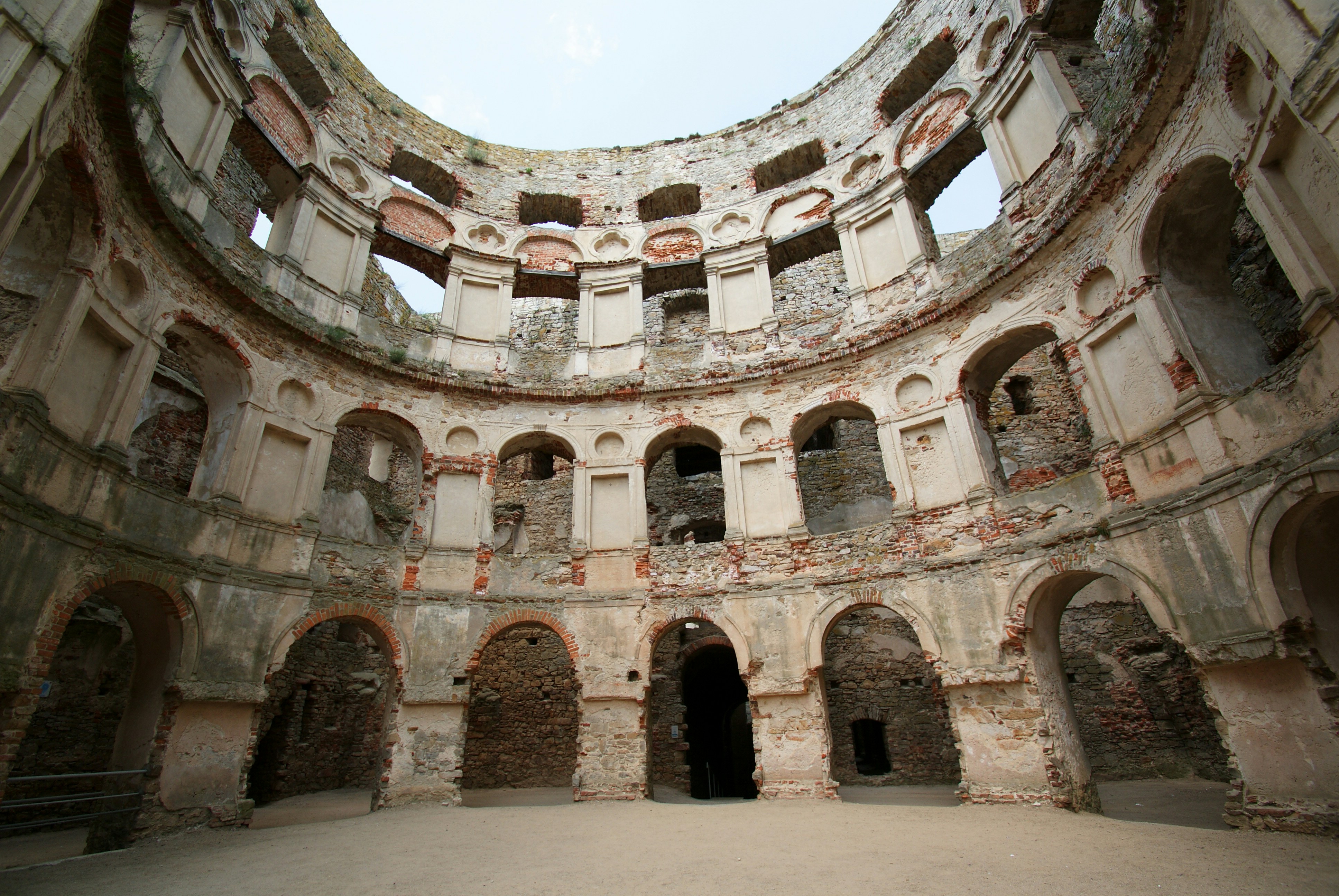 A very old building with a bunch of windows photo – Free Poland Image ...