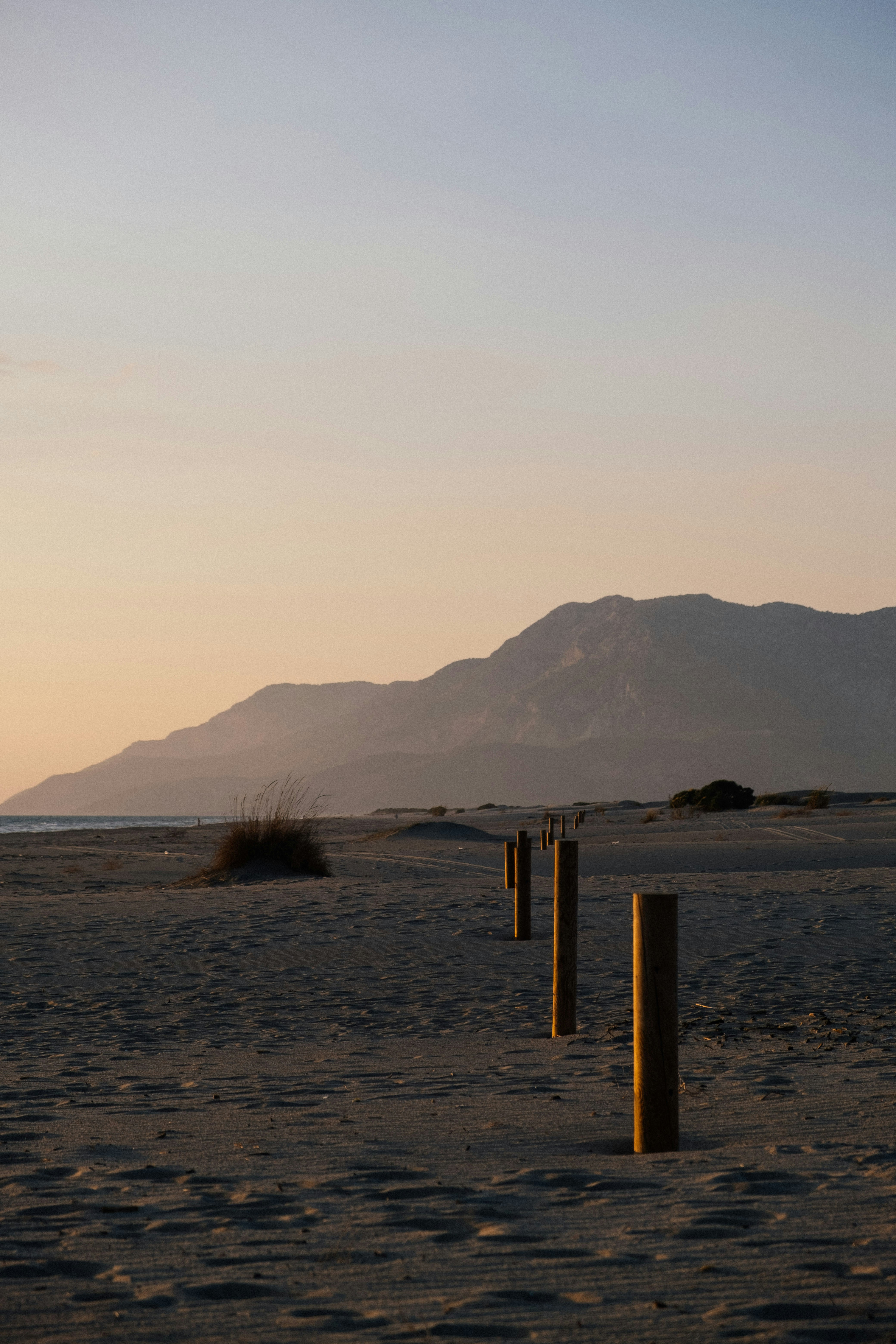 Distant Dunes and Ridge: Post in the Pale Light