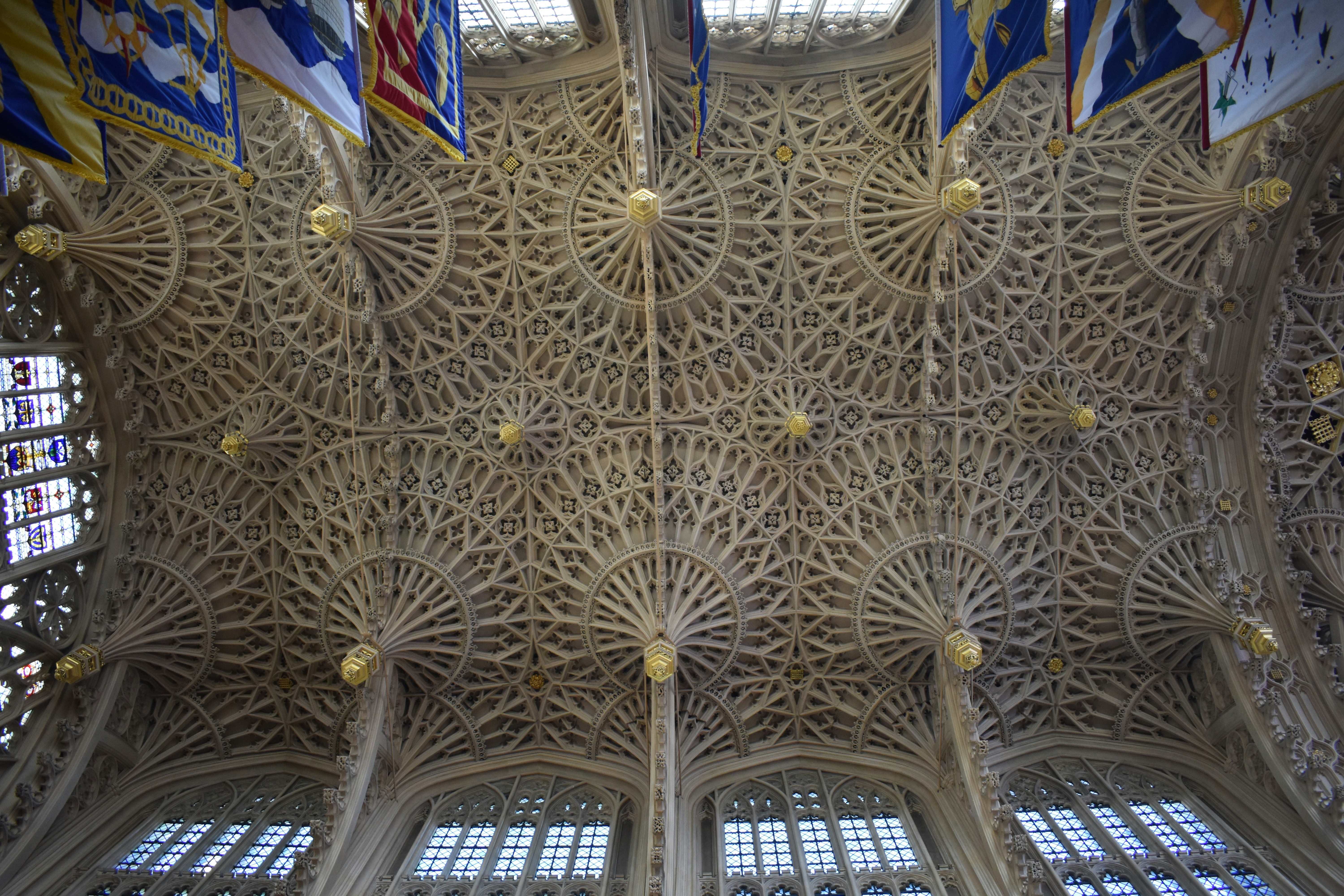 The ceiling of a building with many flags hanging from it photo – Free ...