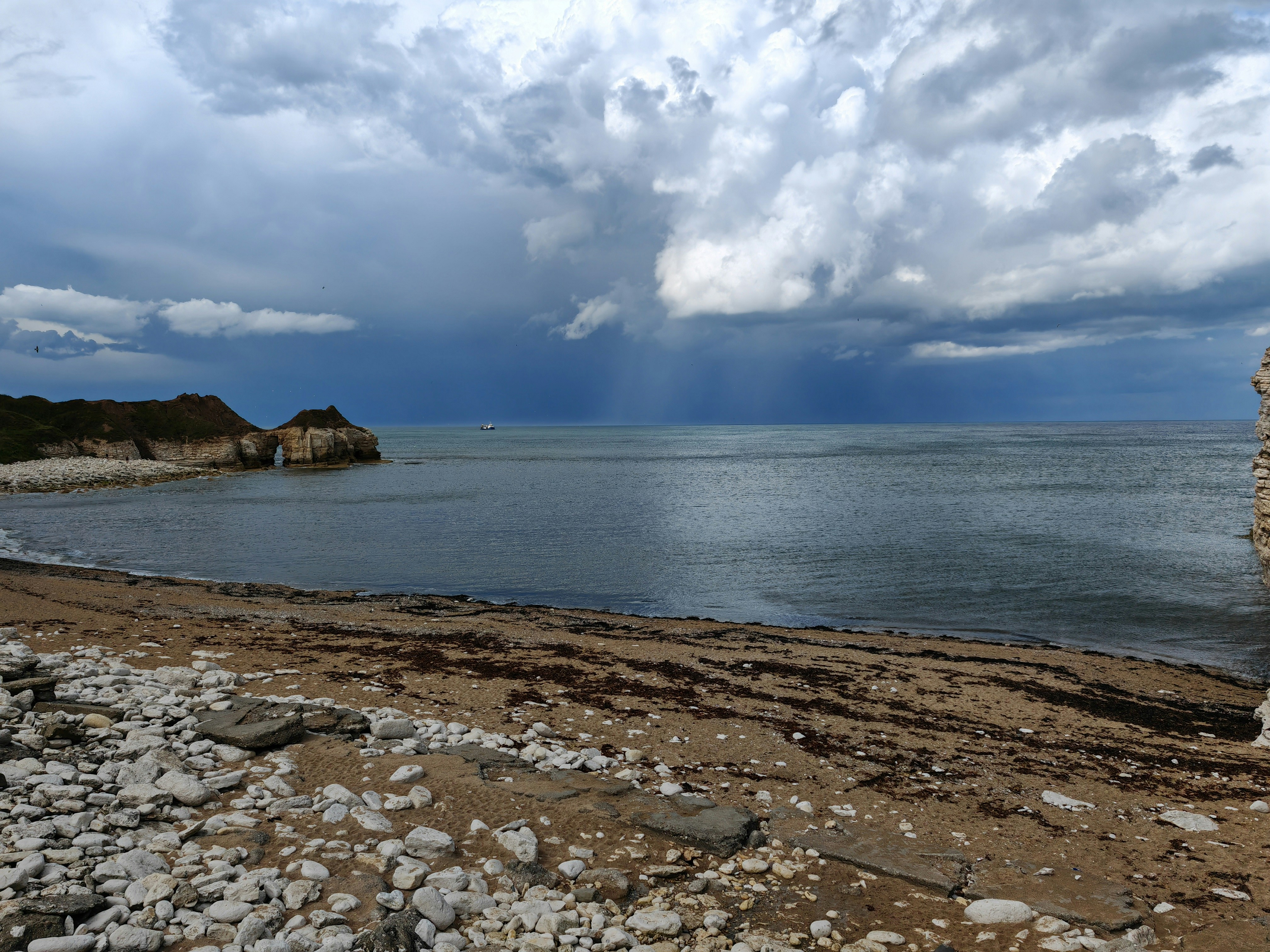Coastal Calm Under Shifting Skies