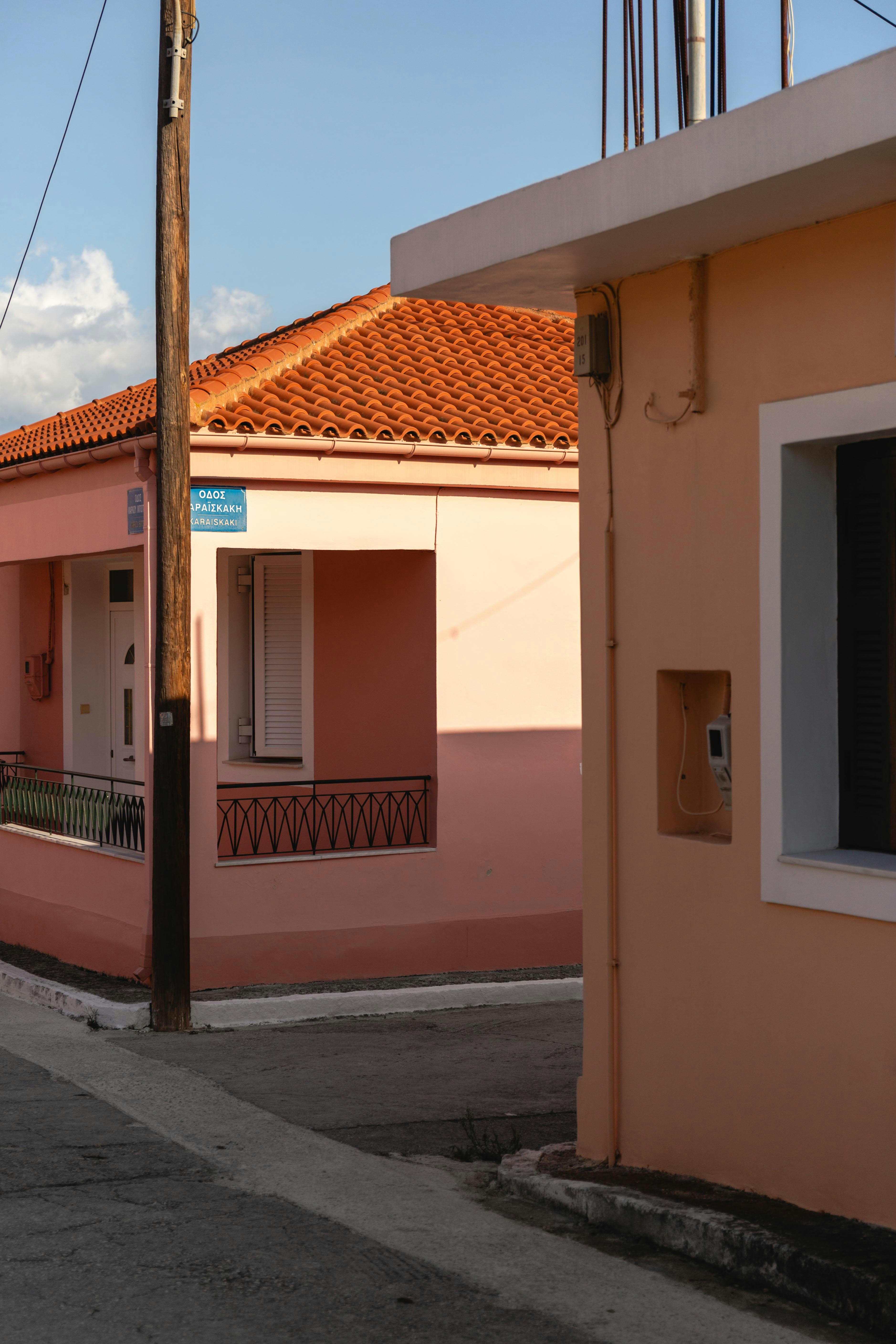 Terracotta Rooftops and Peach Facades: A Quiet Mediterranean Street Corner