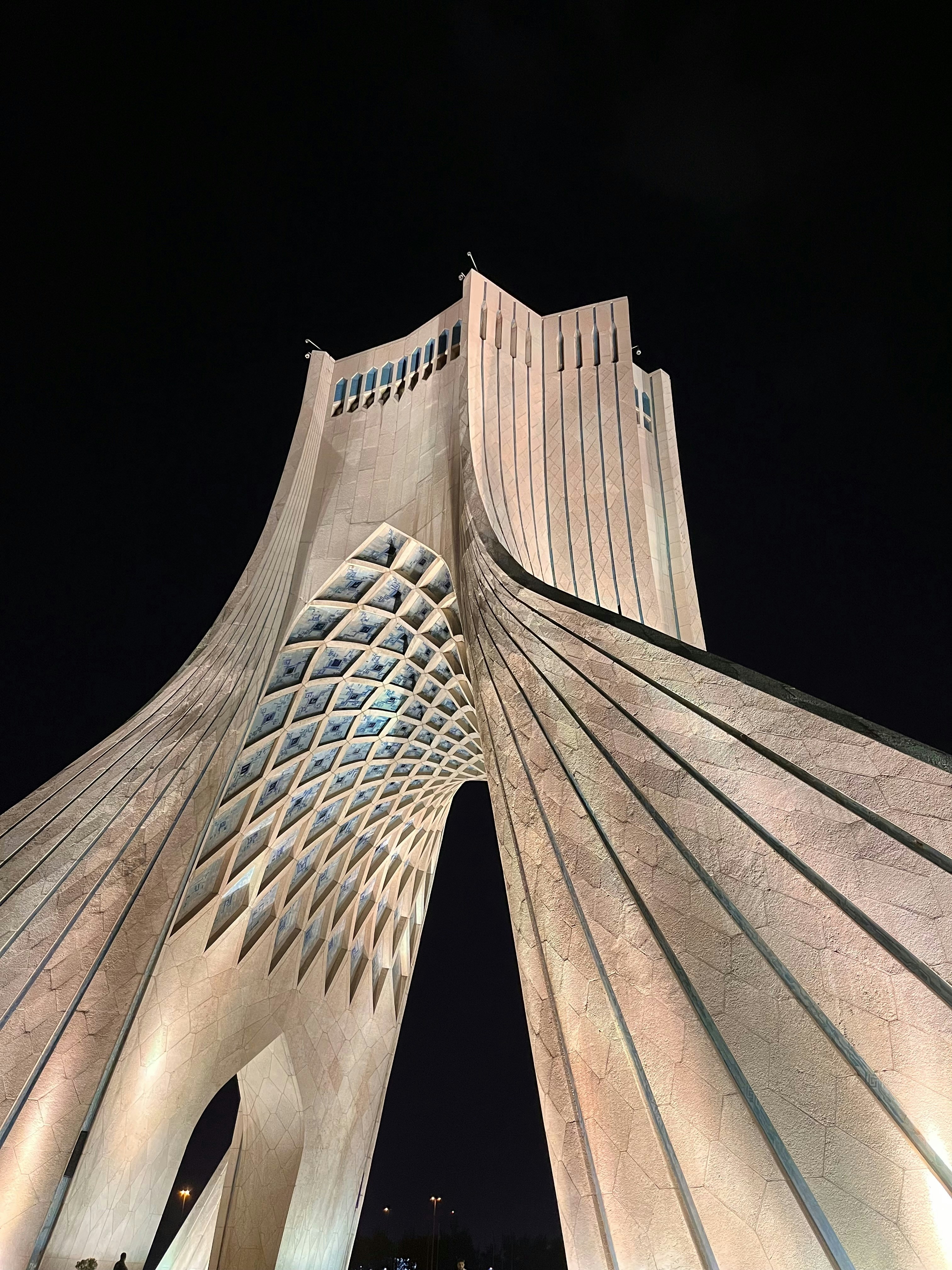 A very tall building with a very tall tower at the top photo – Free ...