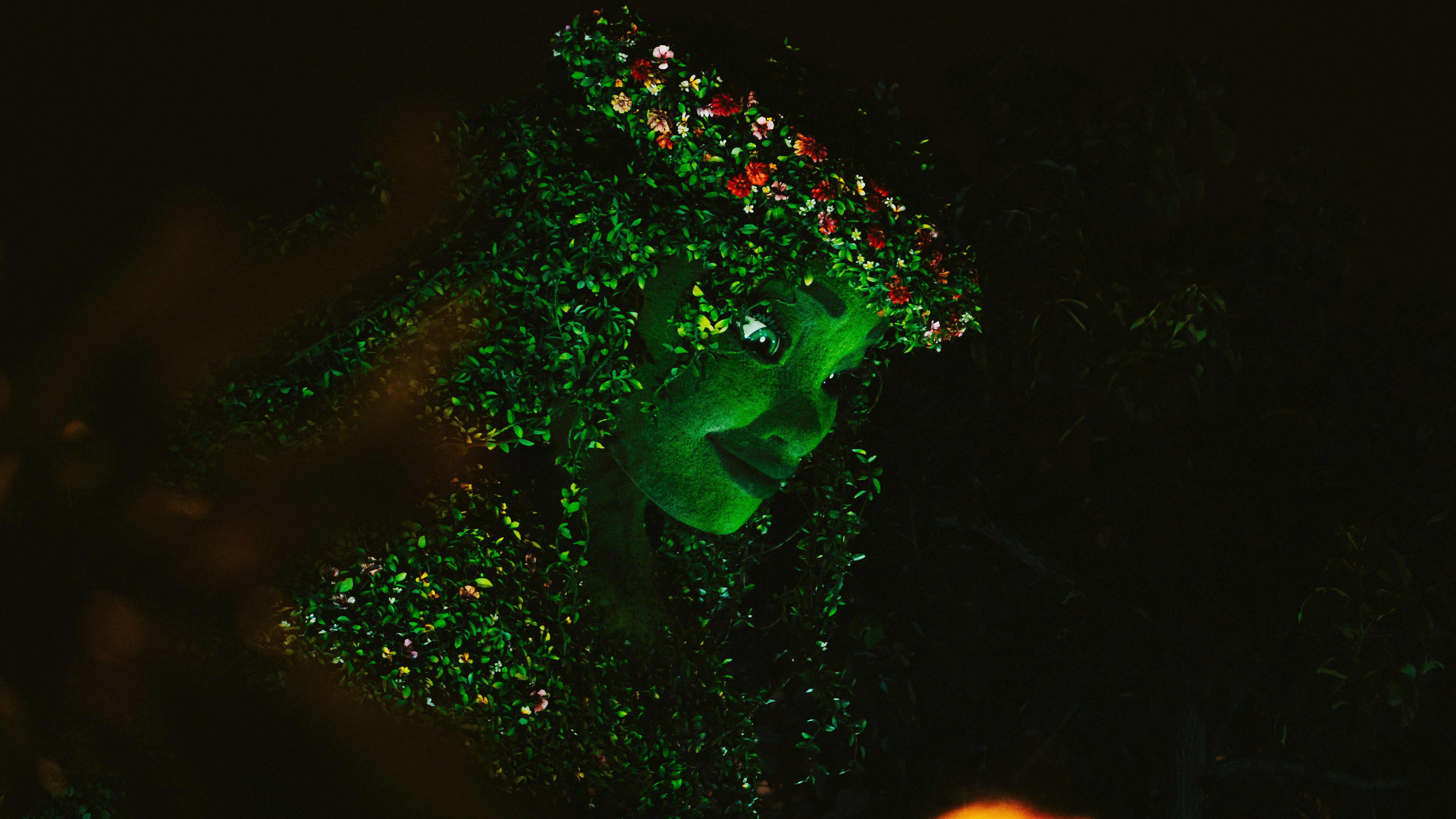Emerald Veil: A Floral-Crowned Portrait in Moonlit Flesh