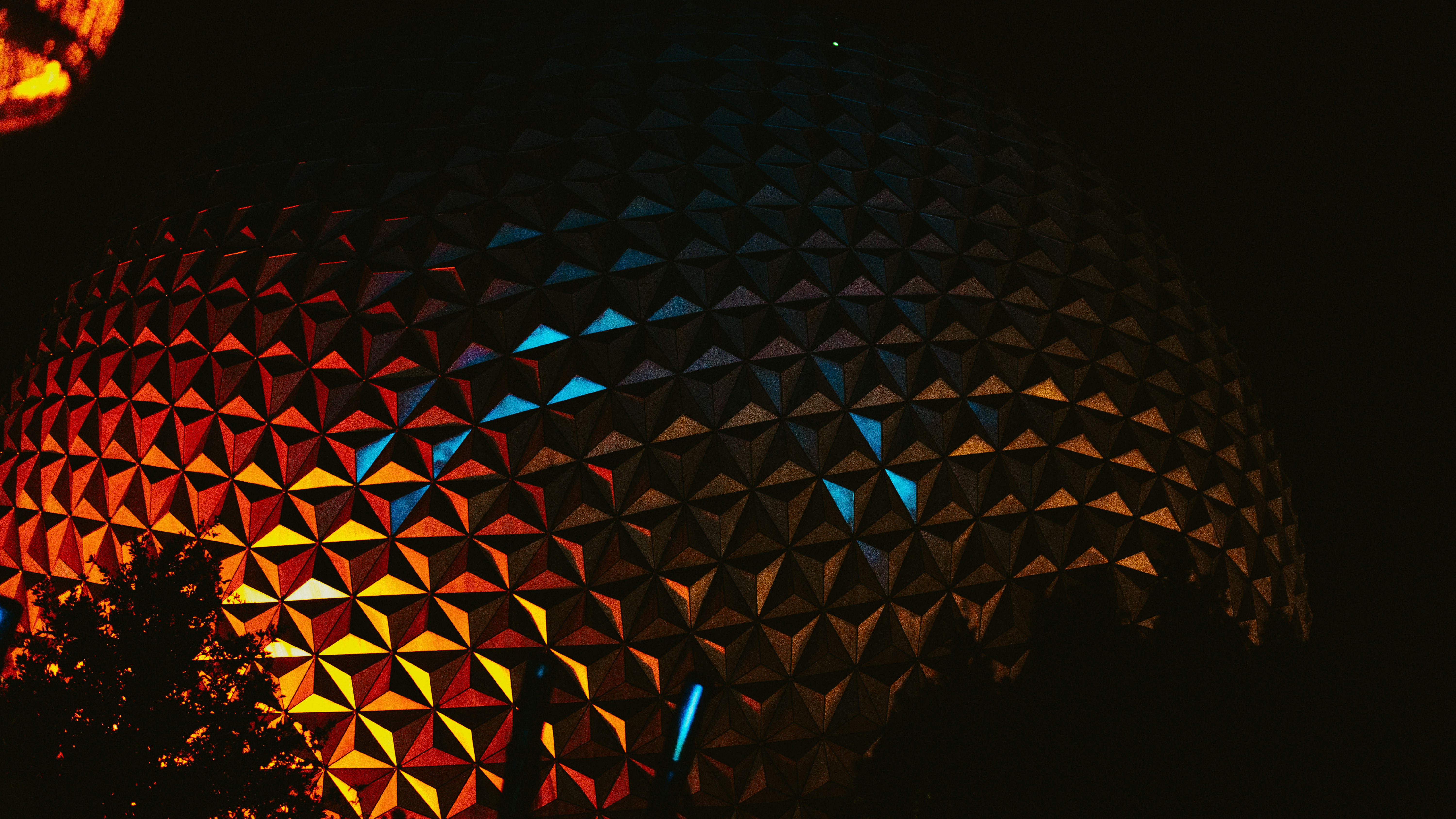 A lit up building in the dark at night photo – Free Epcot Image on Unsplash