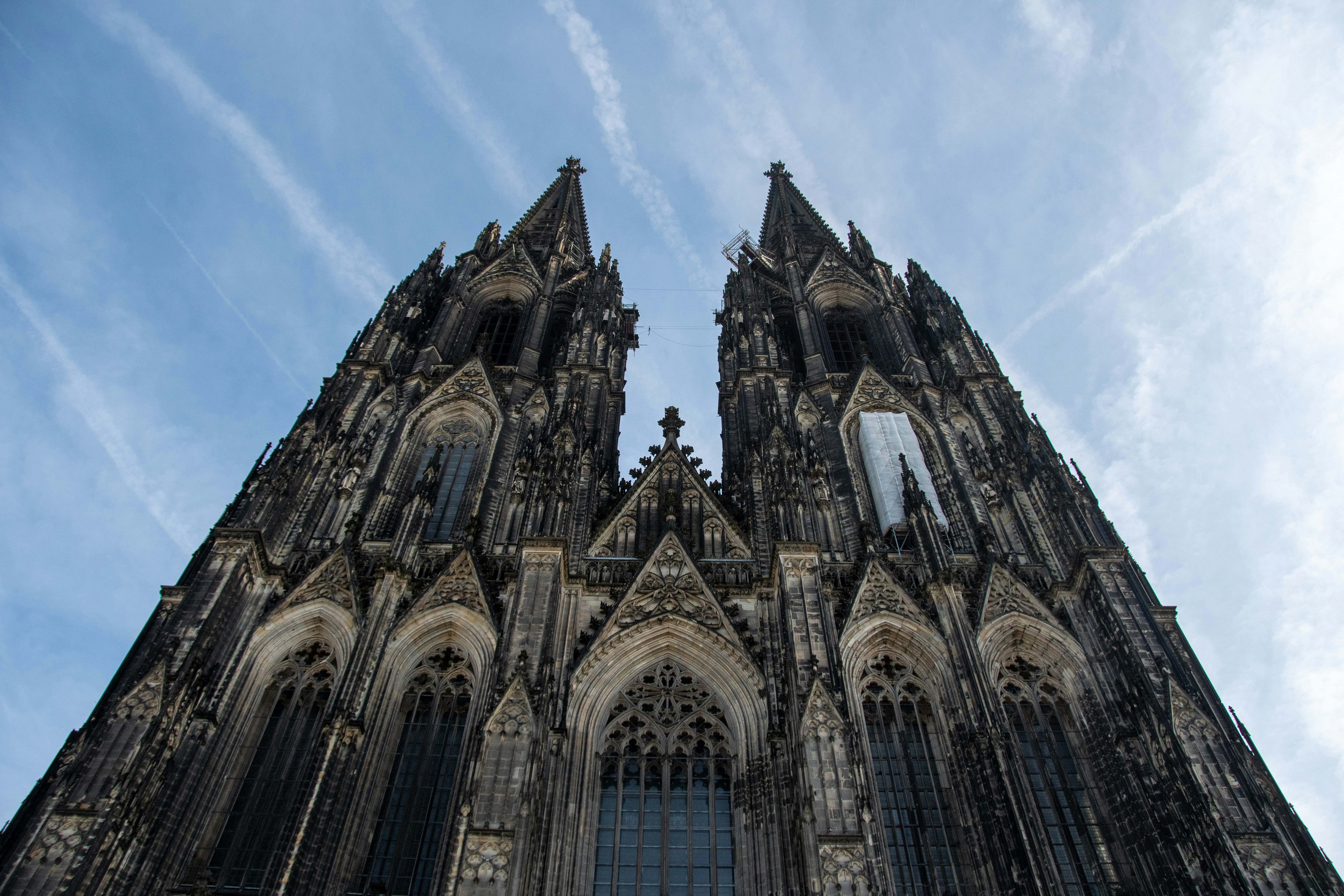 A very tall cathedral with a sky background photo – Free Cologne Image ...