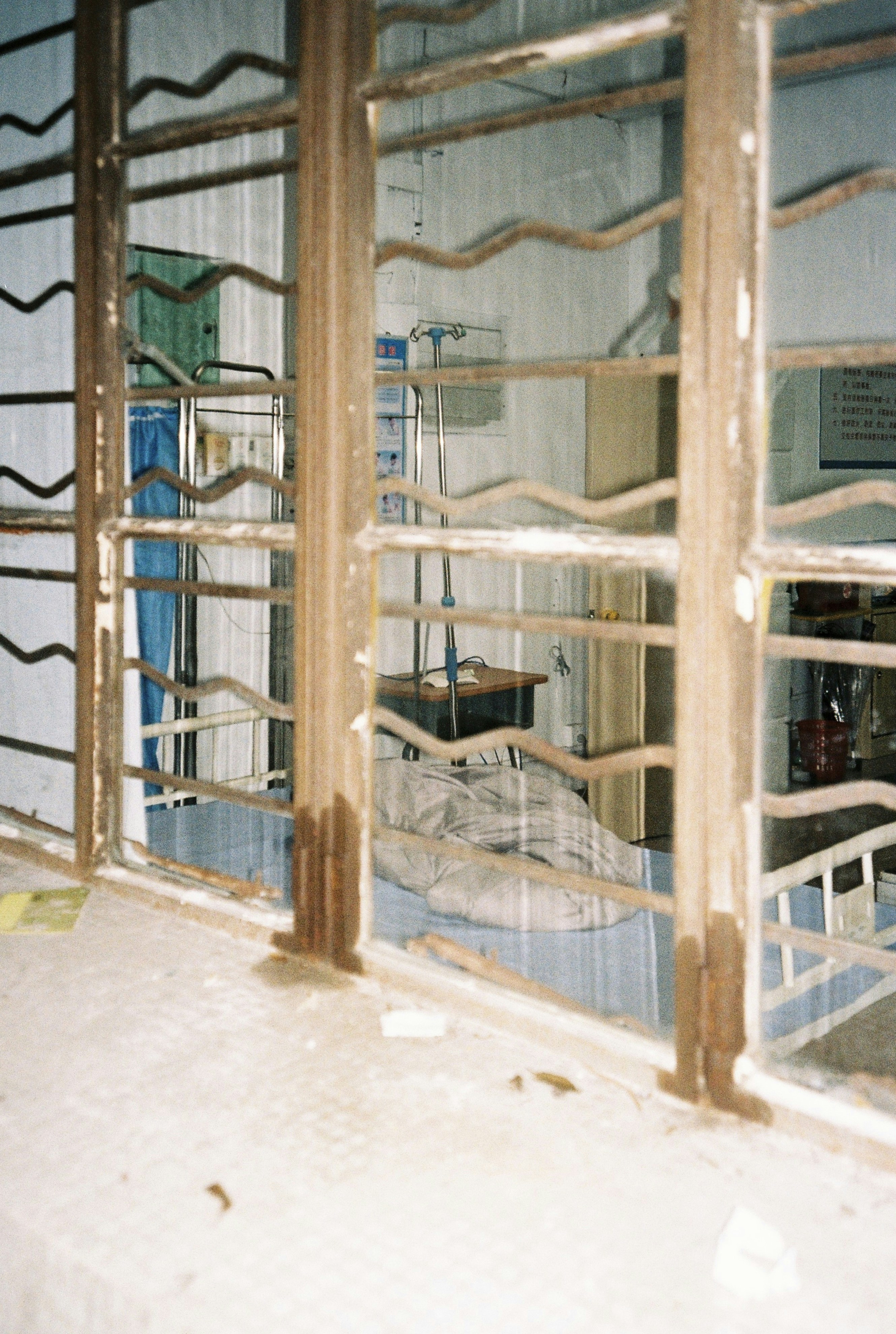 Through Wrought-Iron Grilles to a Quiet Ward