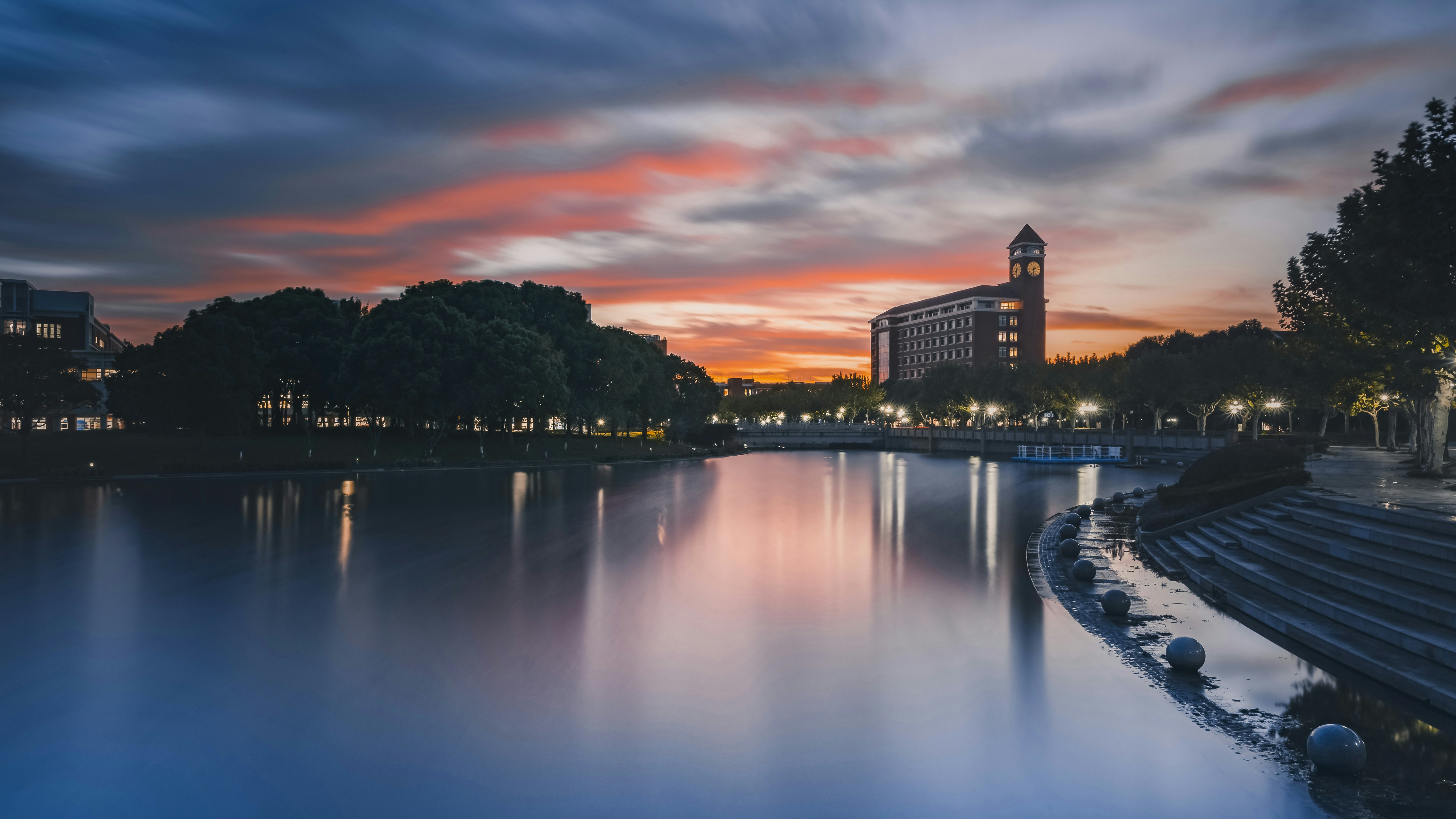 A river with a clock tower in the background photo – Free Cityscape Image on Unsplash