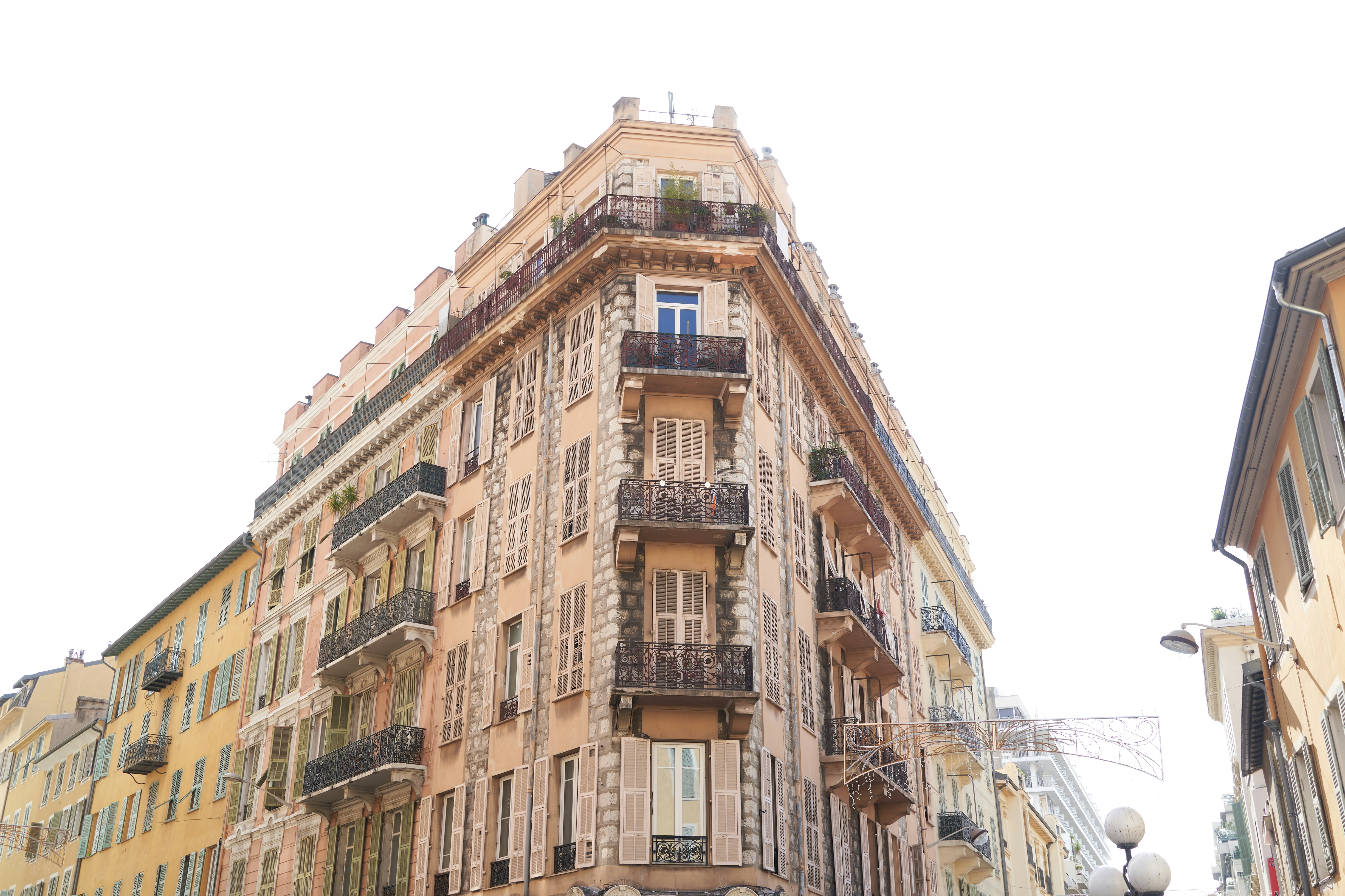 Low angle view of historic French landmark architecture in nice city.