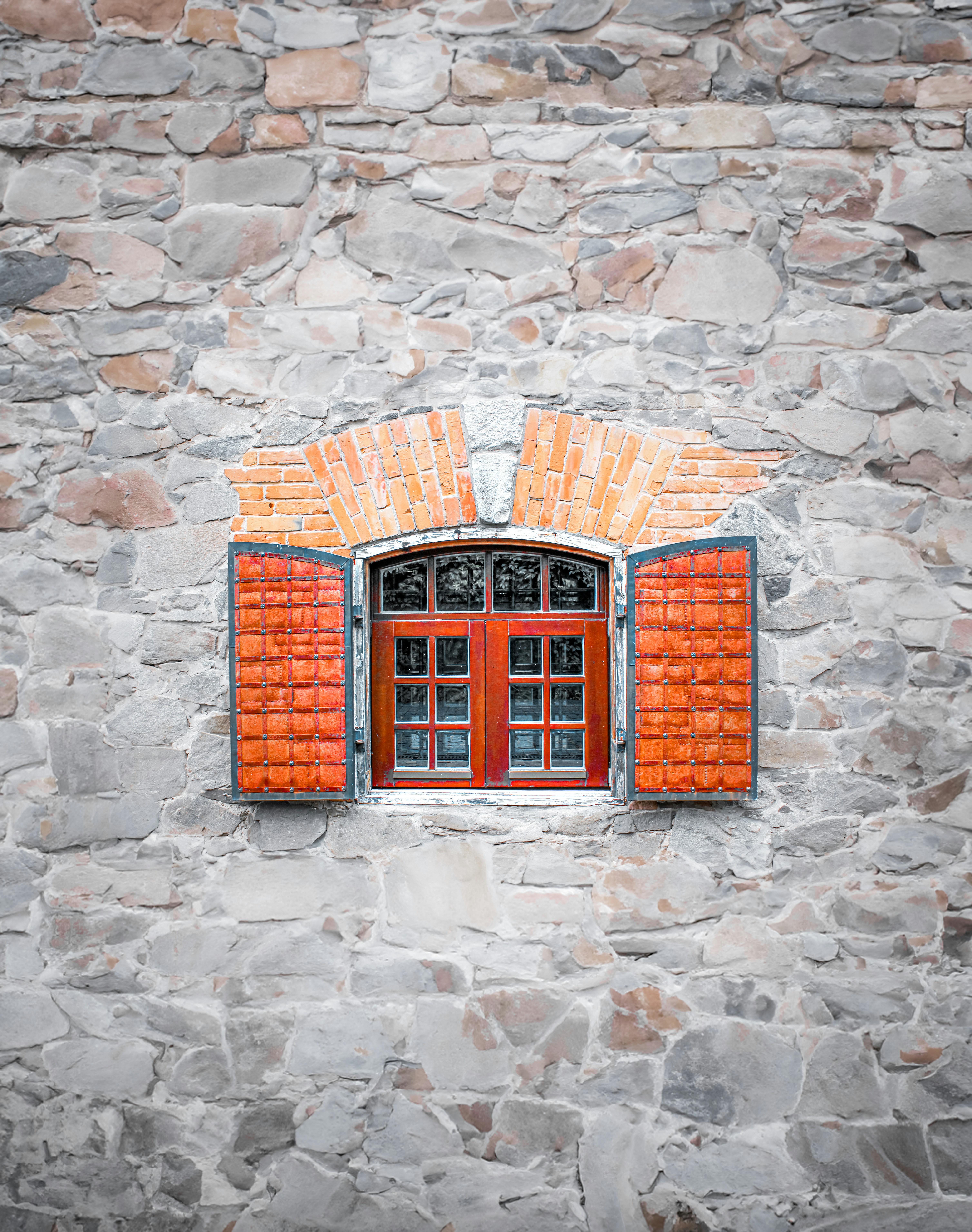 A window with a red shutter and a brick wall photo – Free Ukraine Image ...
