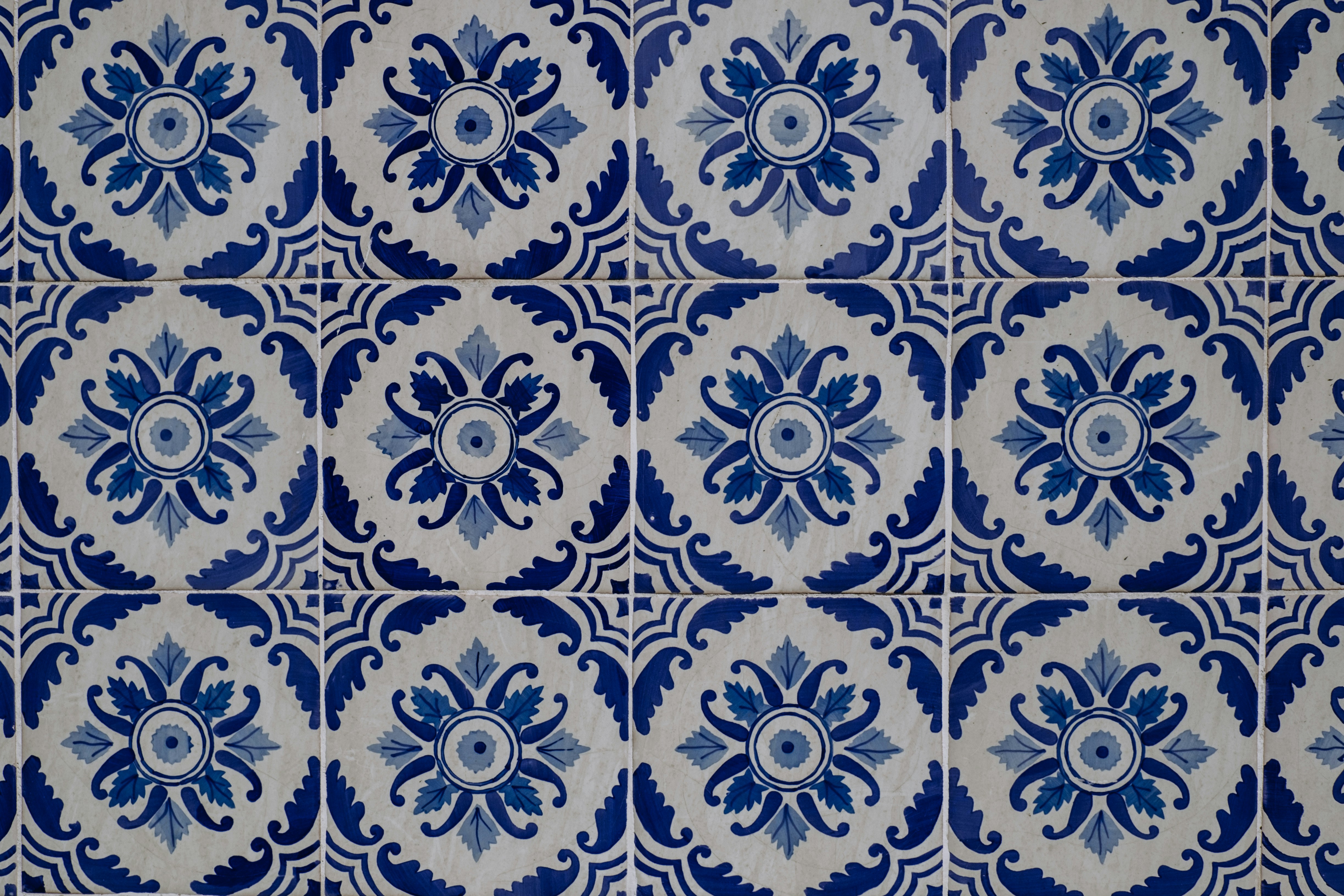A close up of a blue and white tile pattern photo – Free Porto Image on ...