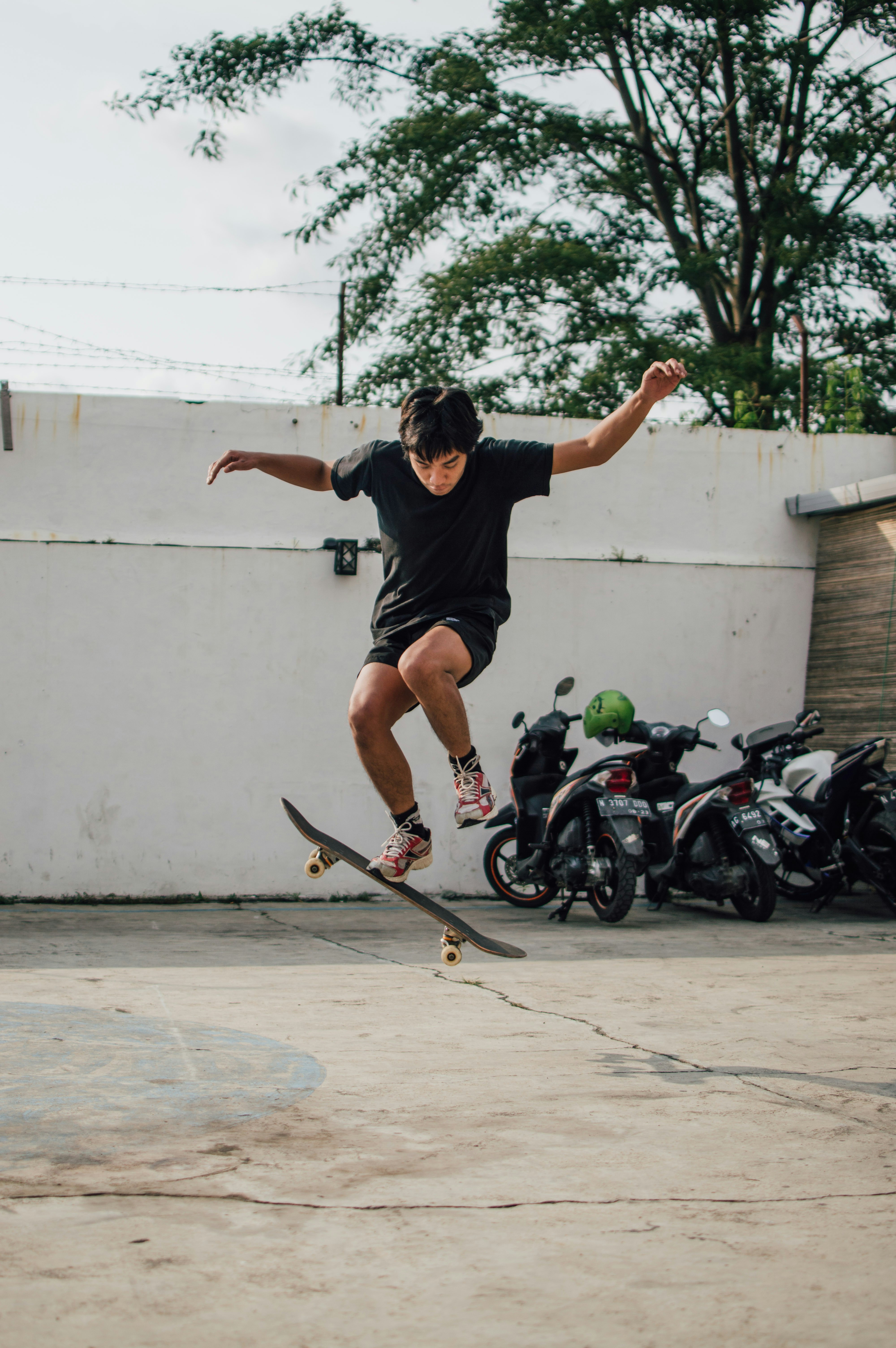 Midair Glide Over the Concrete Yard