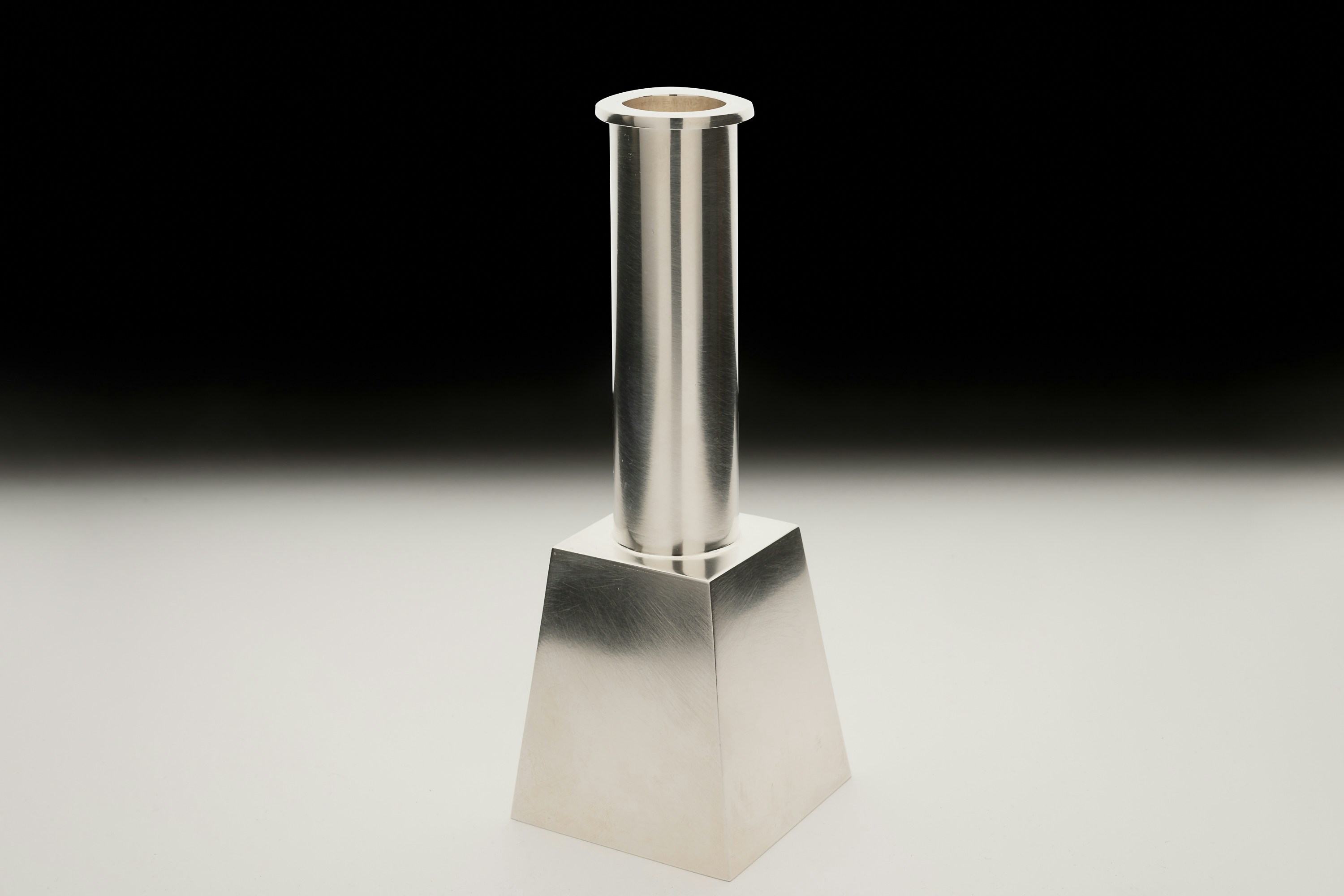 A tall metal object sitting on top of a table photo – Free Image on ...
