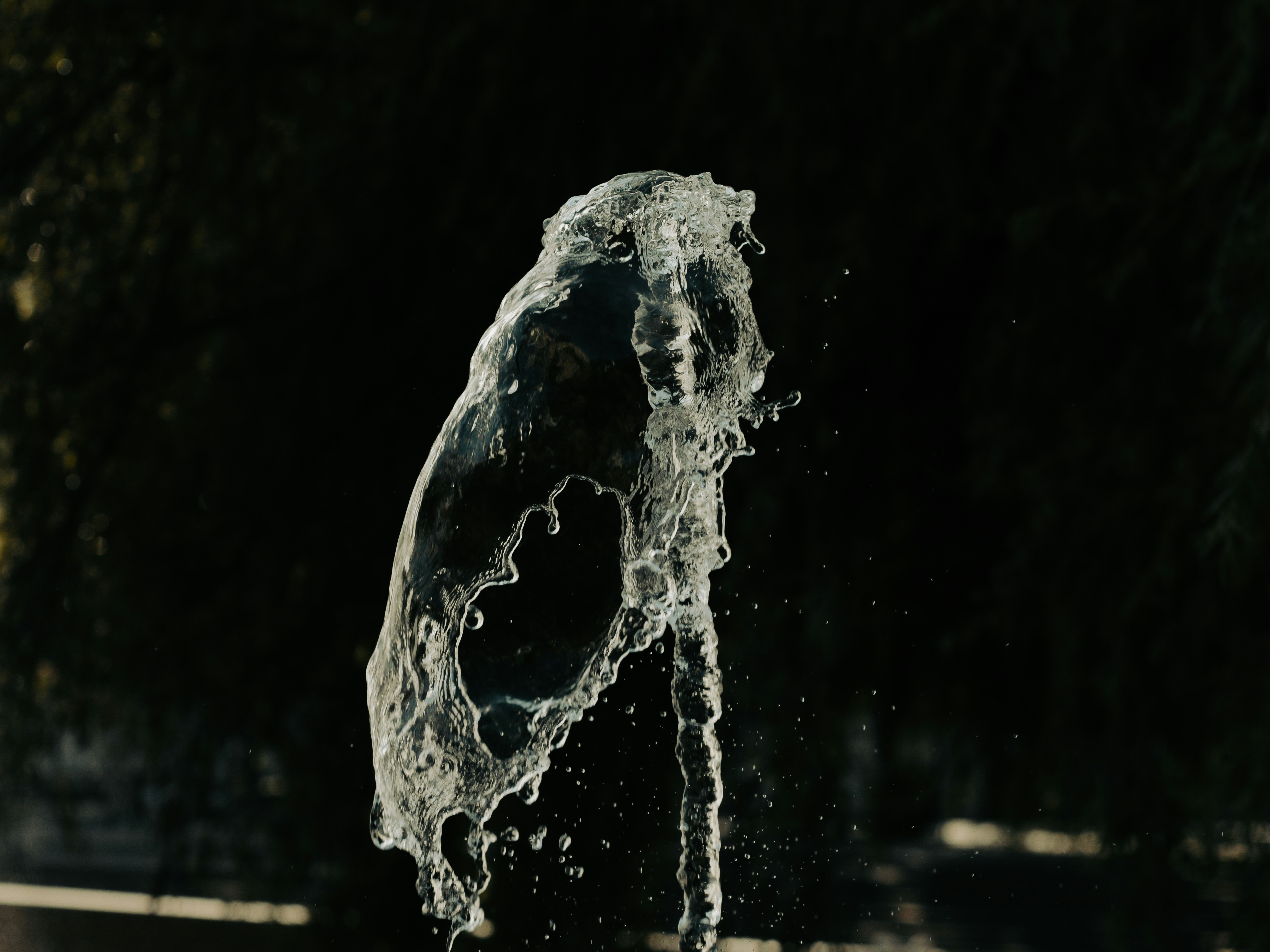 A water fountain spewing out of it's side photo – Free Woman Image on ...