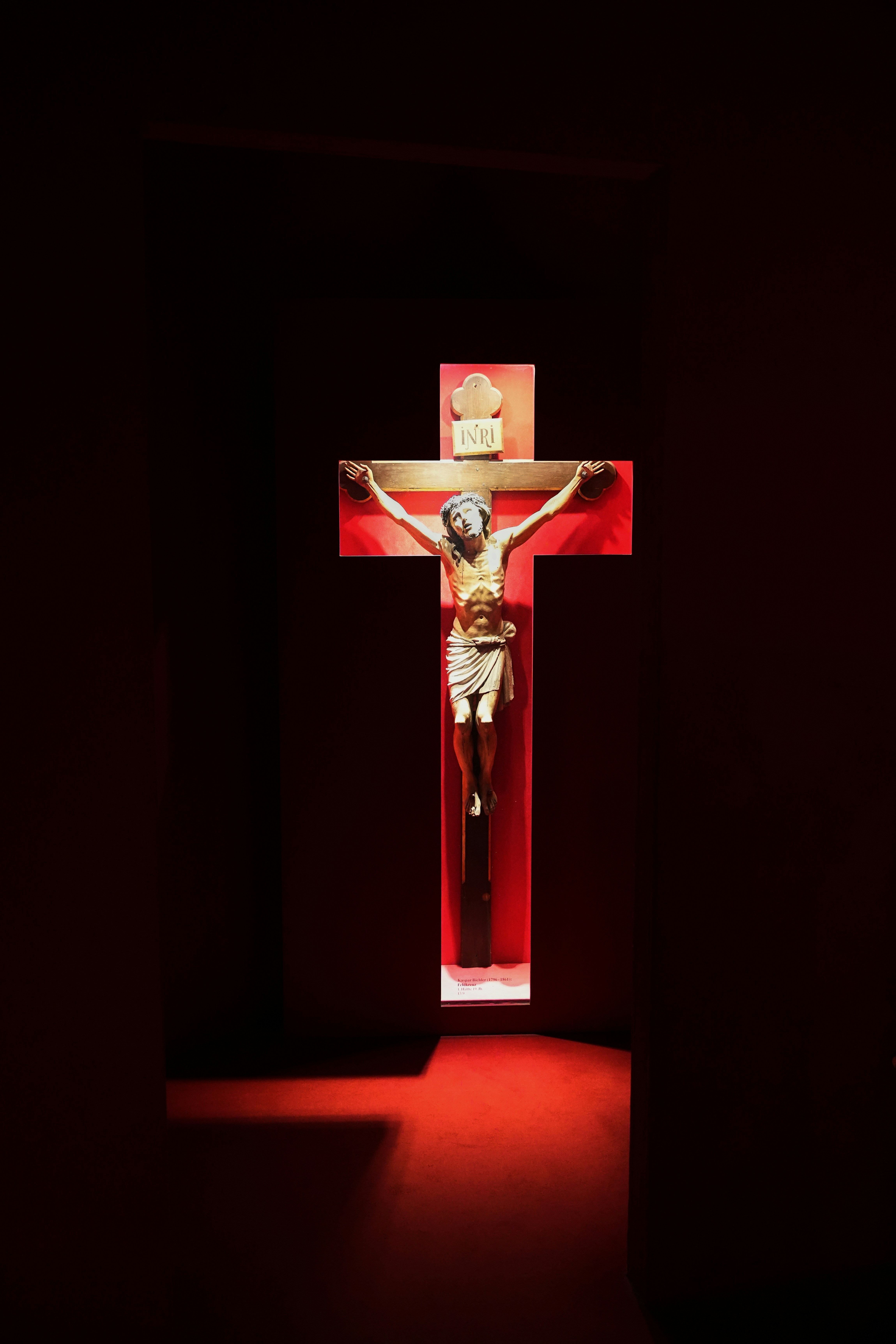 A crucifix in a dimly lit room photo – Free Jesus christ Image on Unsplash