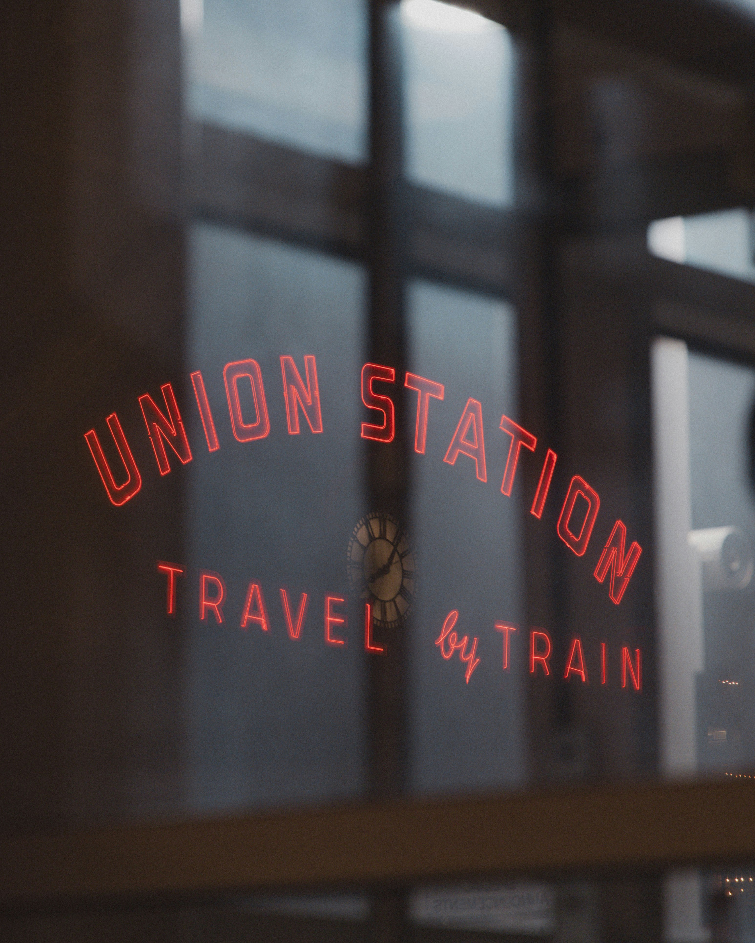 A reflection of the union station sign in a window photo – Free ...